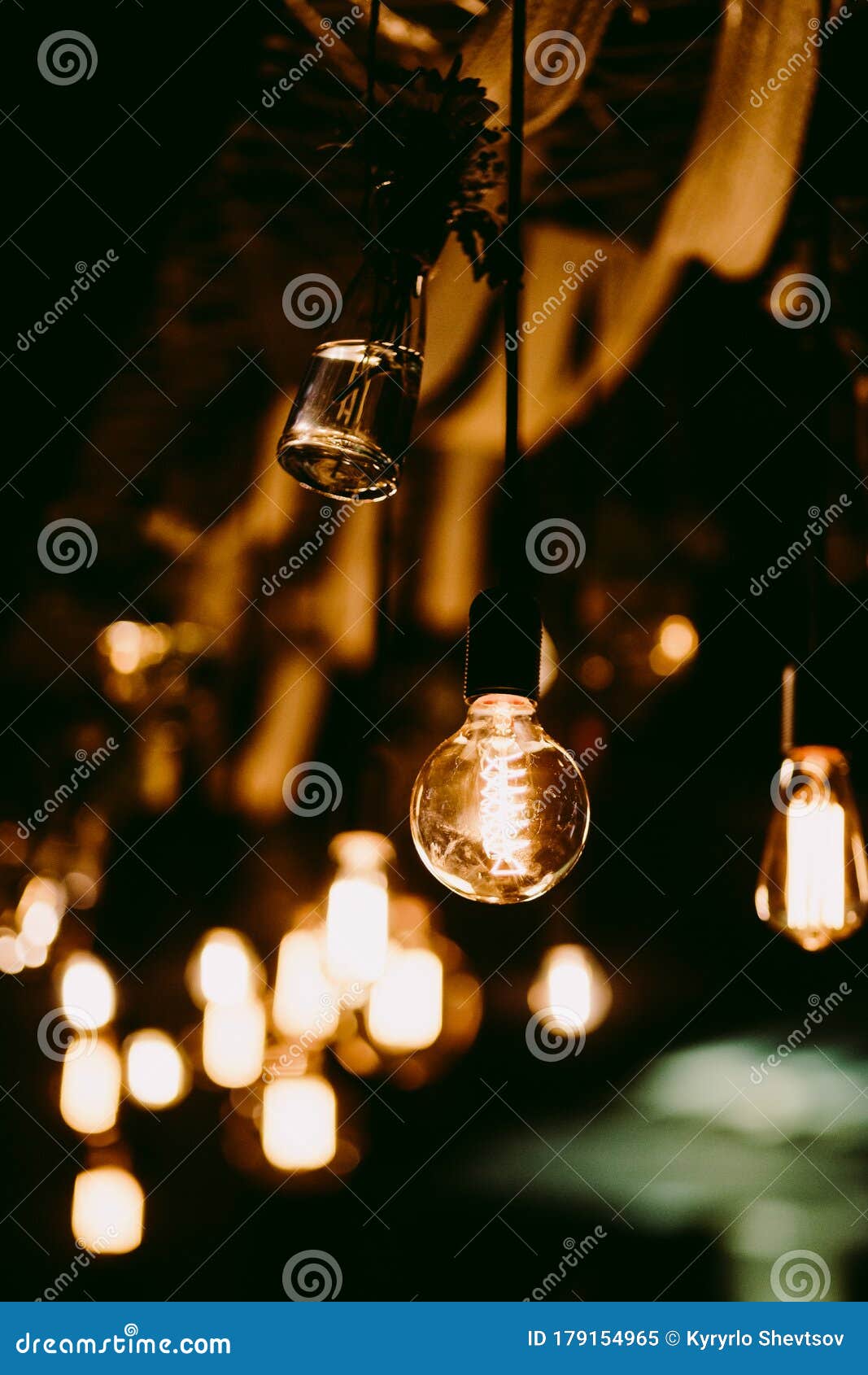 Vintage light bulbs in bar stock image. Image of party - 179154965