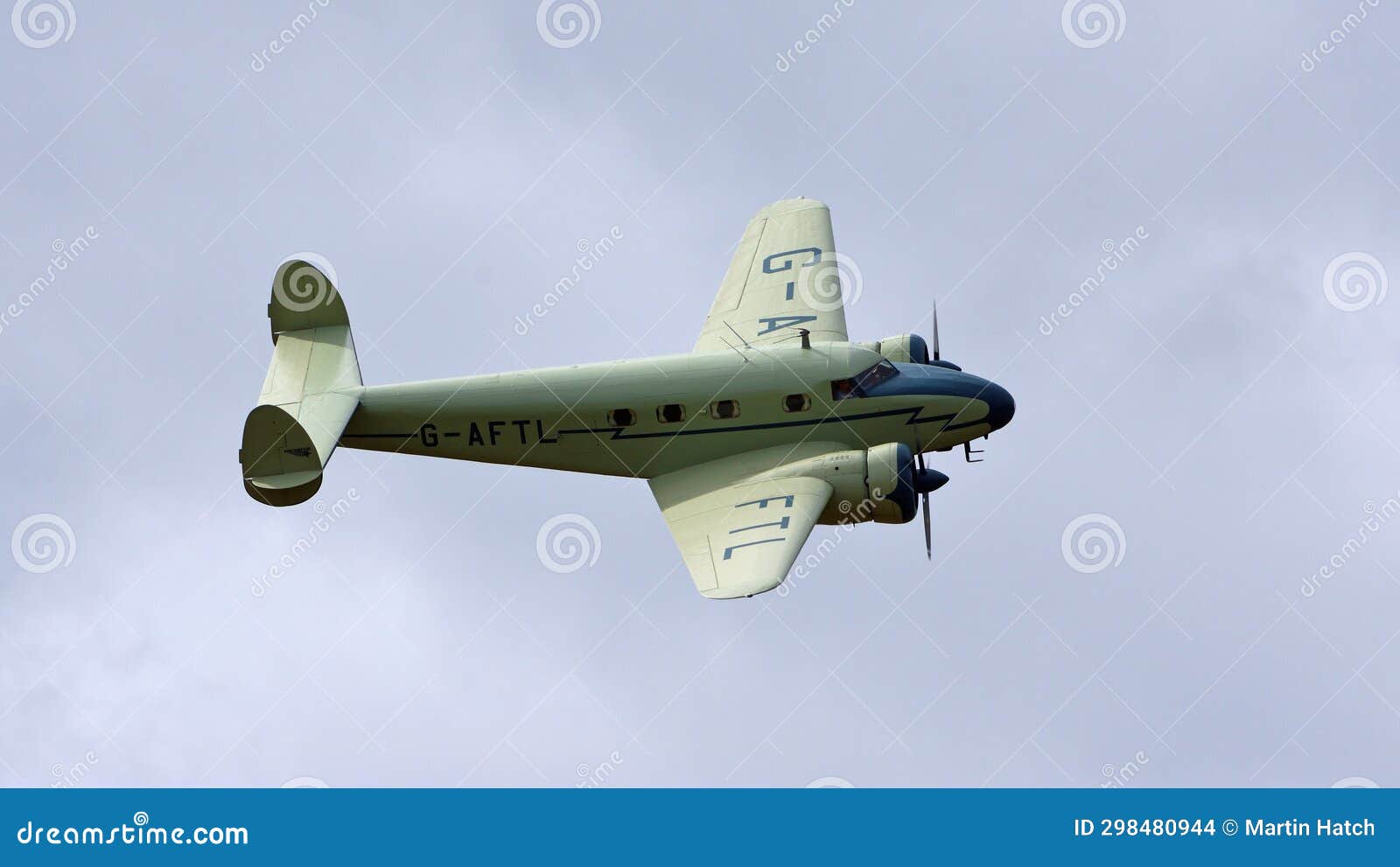 Vintage Lockheed 12A Electra Junior in Flight Editorial Stock Image ...