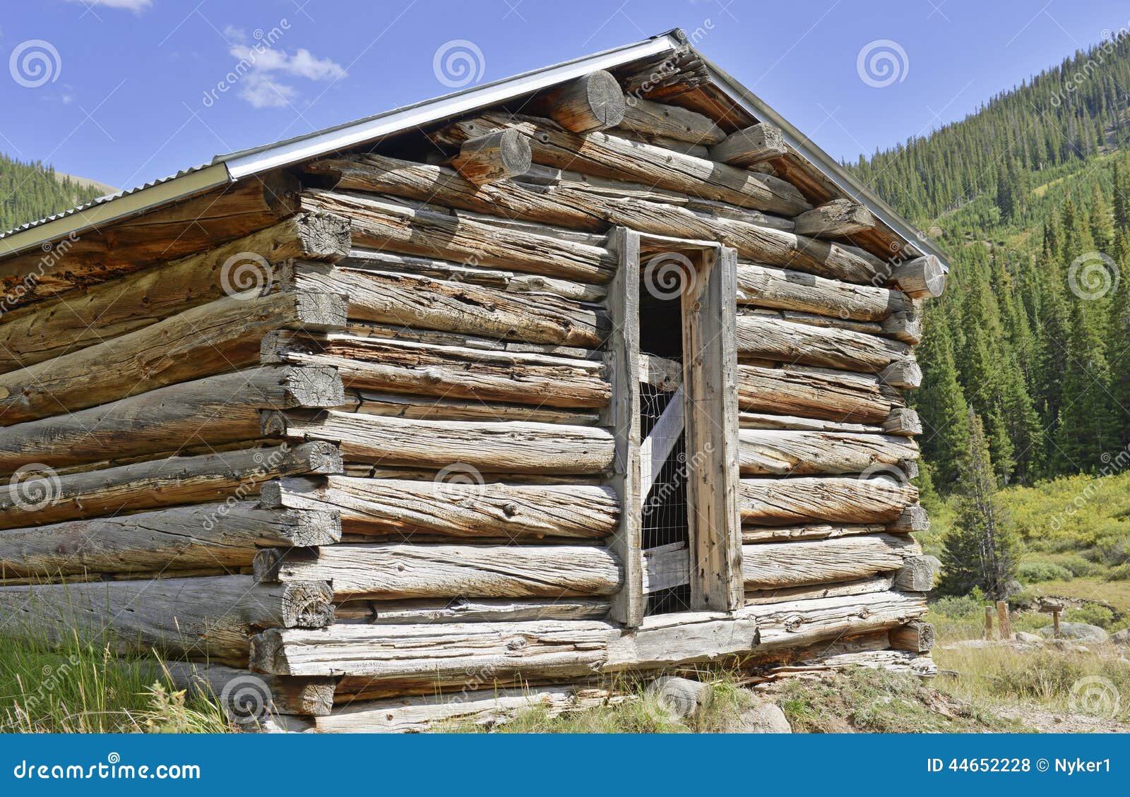 Vintage Log Cabin in Old Mining Town in the Mountains Stock Photo ...