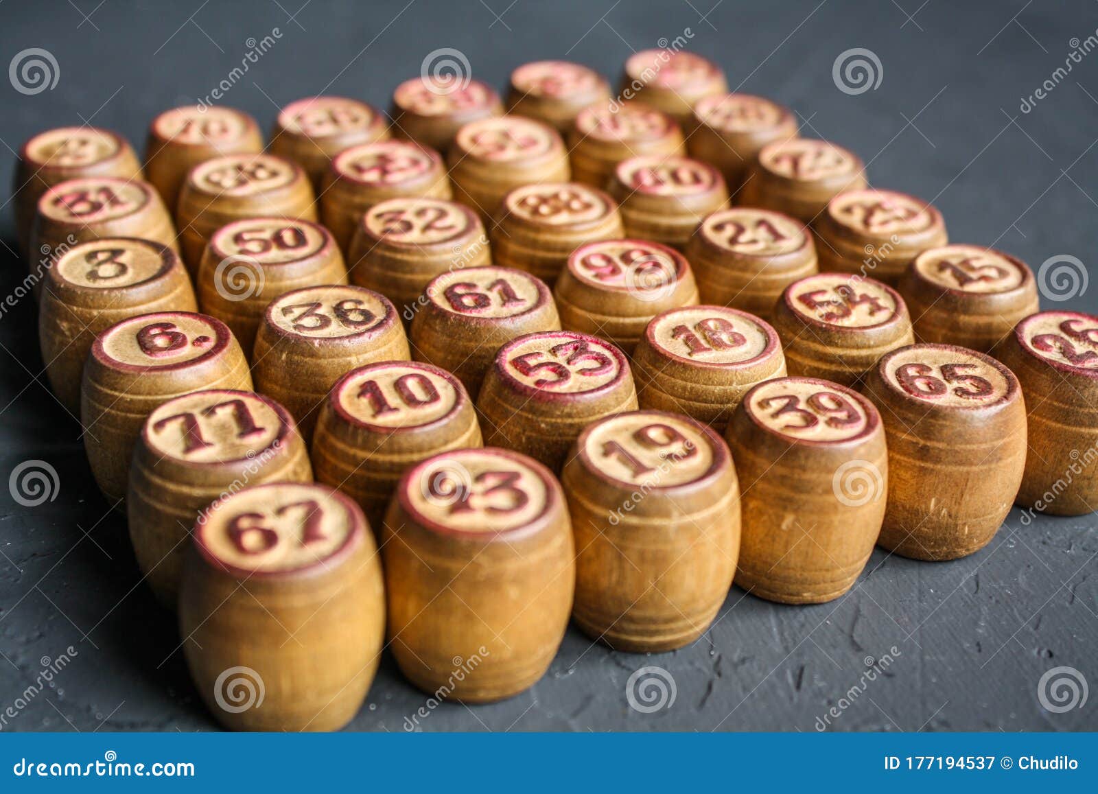 Vintage Lotto Barrels are Arranged in Random Order on a Dark Surface ...