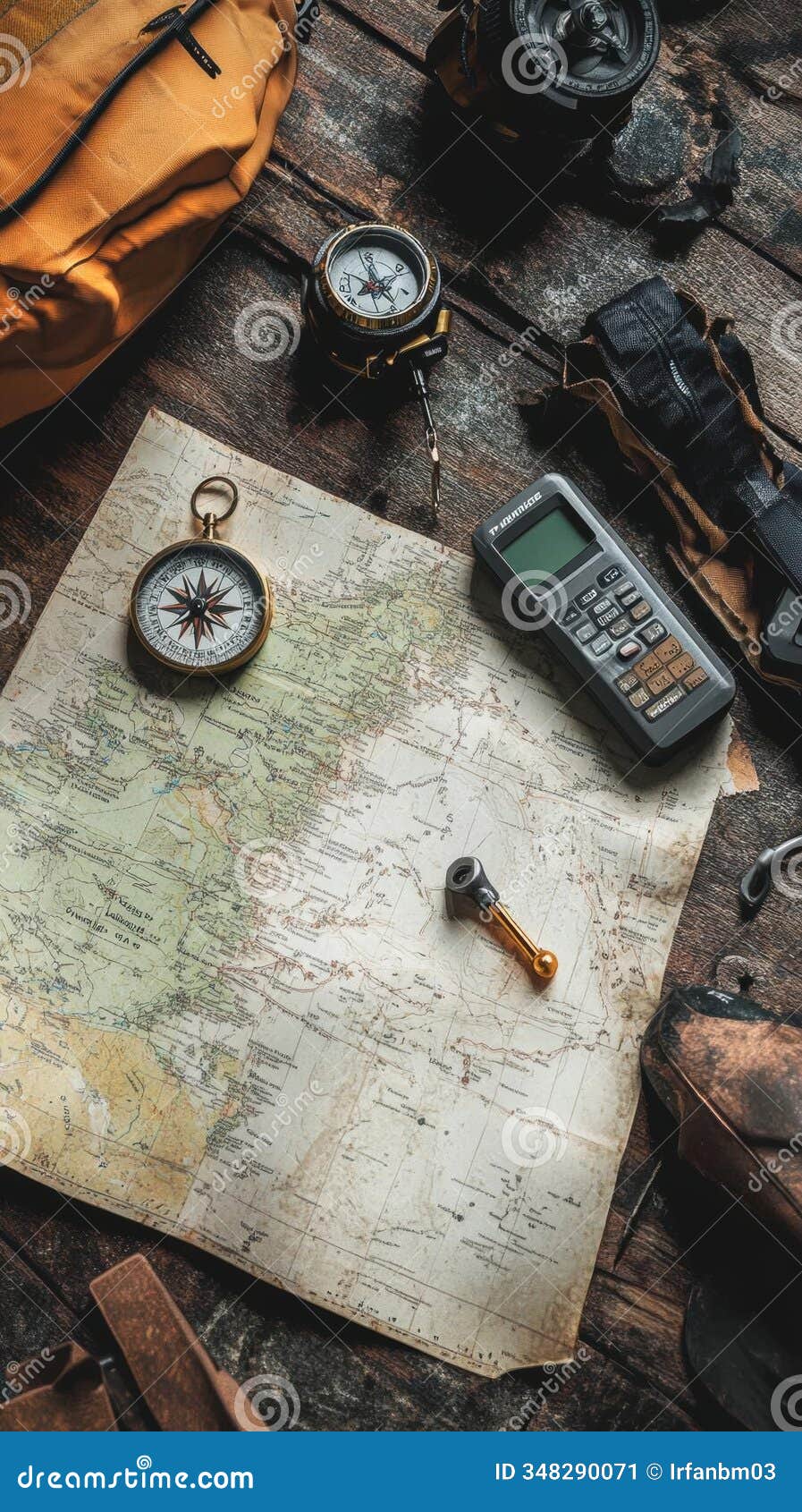 Vintage Map with Compass, GPS Device, and Hiking Gear Stock Image ...