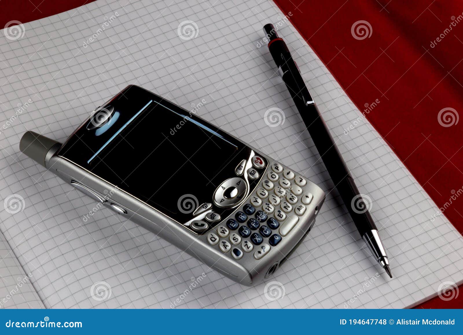 Vintage Mobile Phone with Pencil on Squared Paper Stock Photo - Image ...