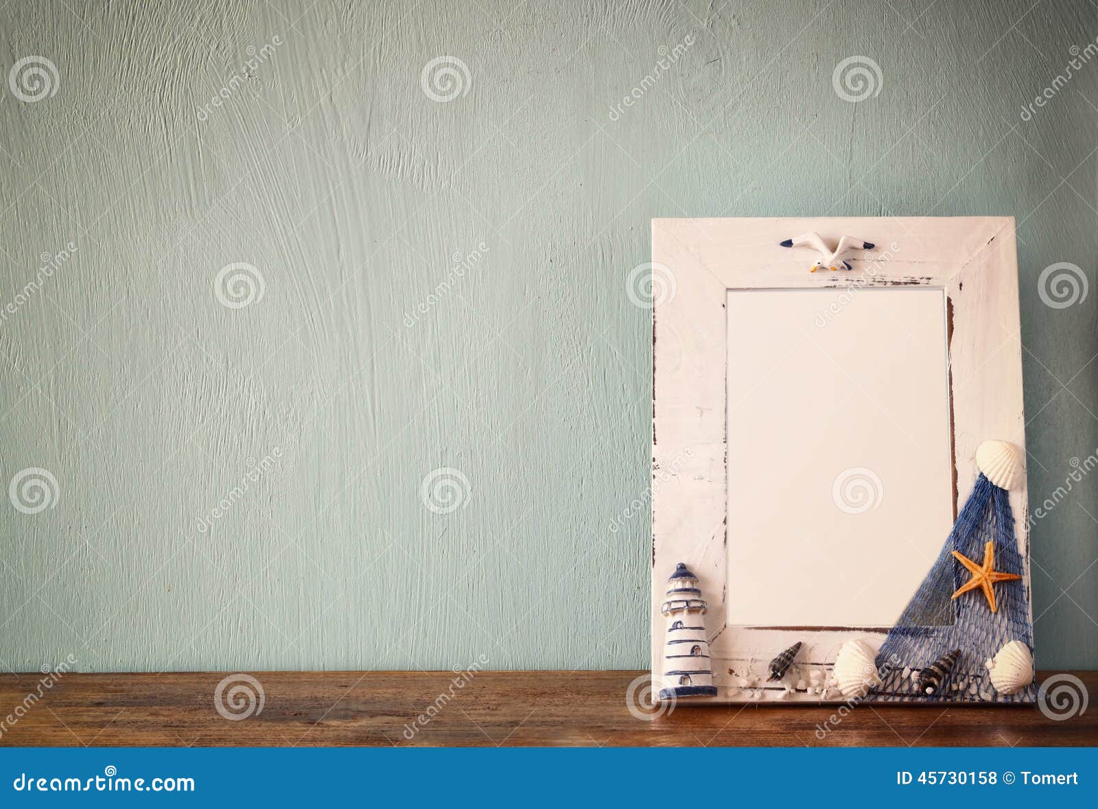 Vintage Nautical Frame on Wooden Table. Retro Filtered Image Stock ...