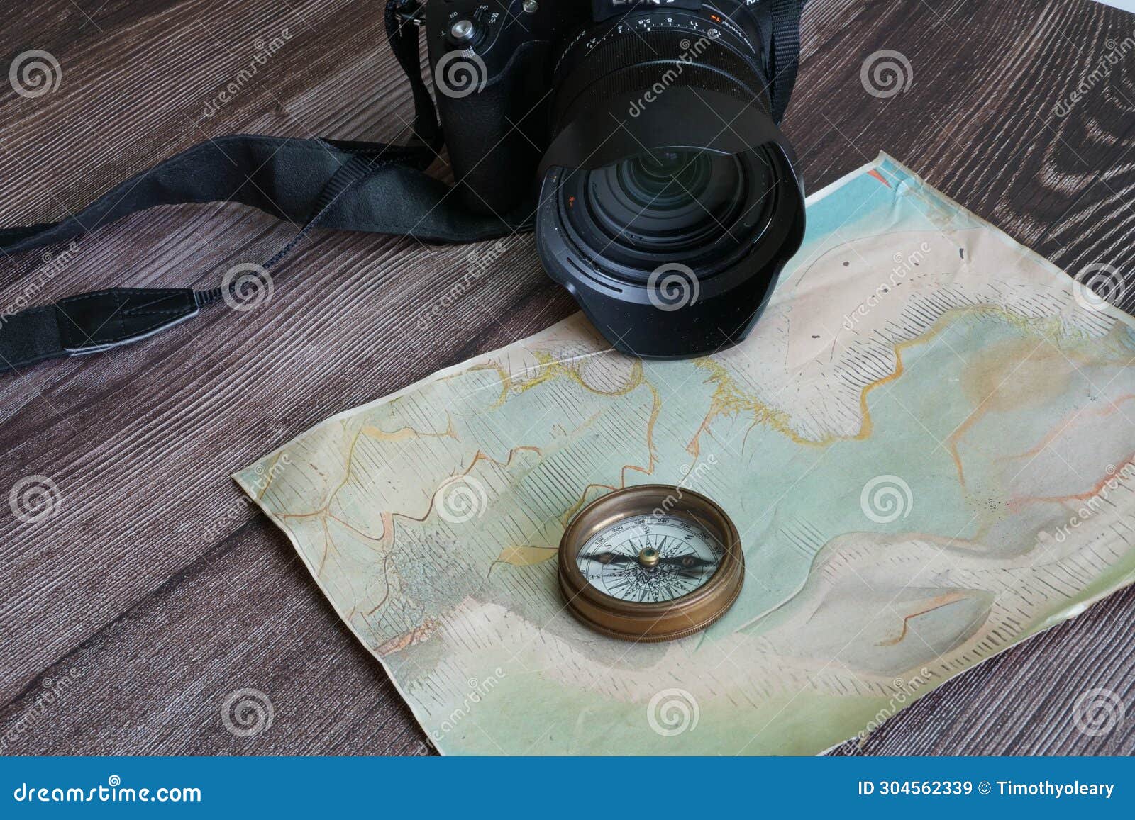Vintage Navigational Compass with a Camera on a Hand Made Map Stock ...