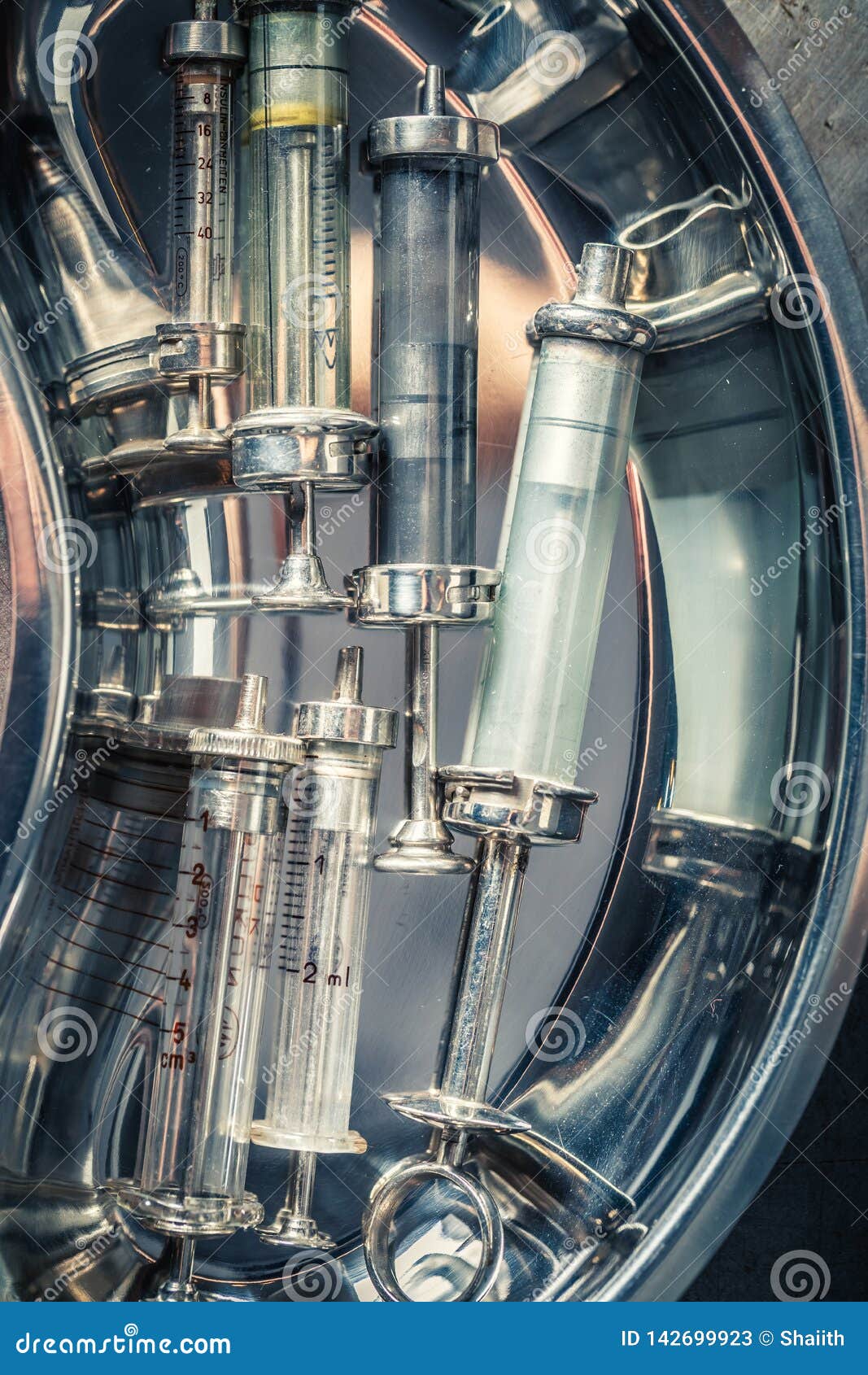 Vintage Needle and Syringes in a Stainless Steel Container Stock Image ...