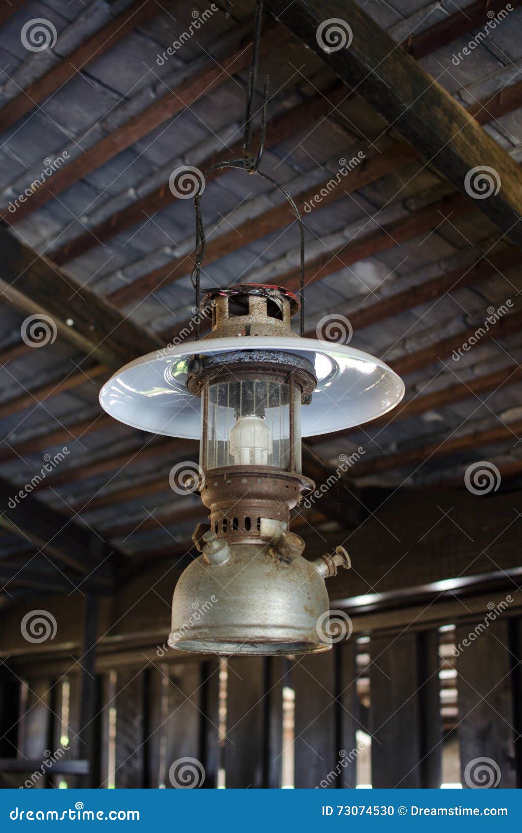 Vintage oil lantern stock photo. Image of aged, wood - 73074530