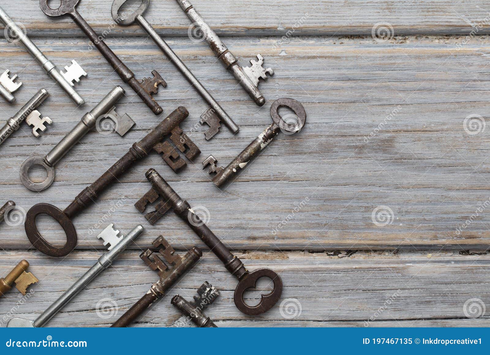 Old Fashioned Keys On Wooden Aged Background With Frame Concept Stock ...