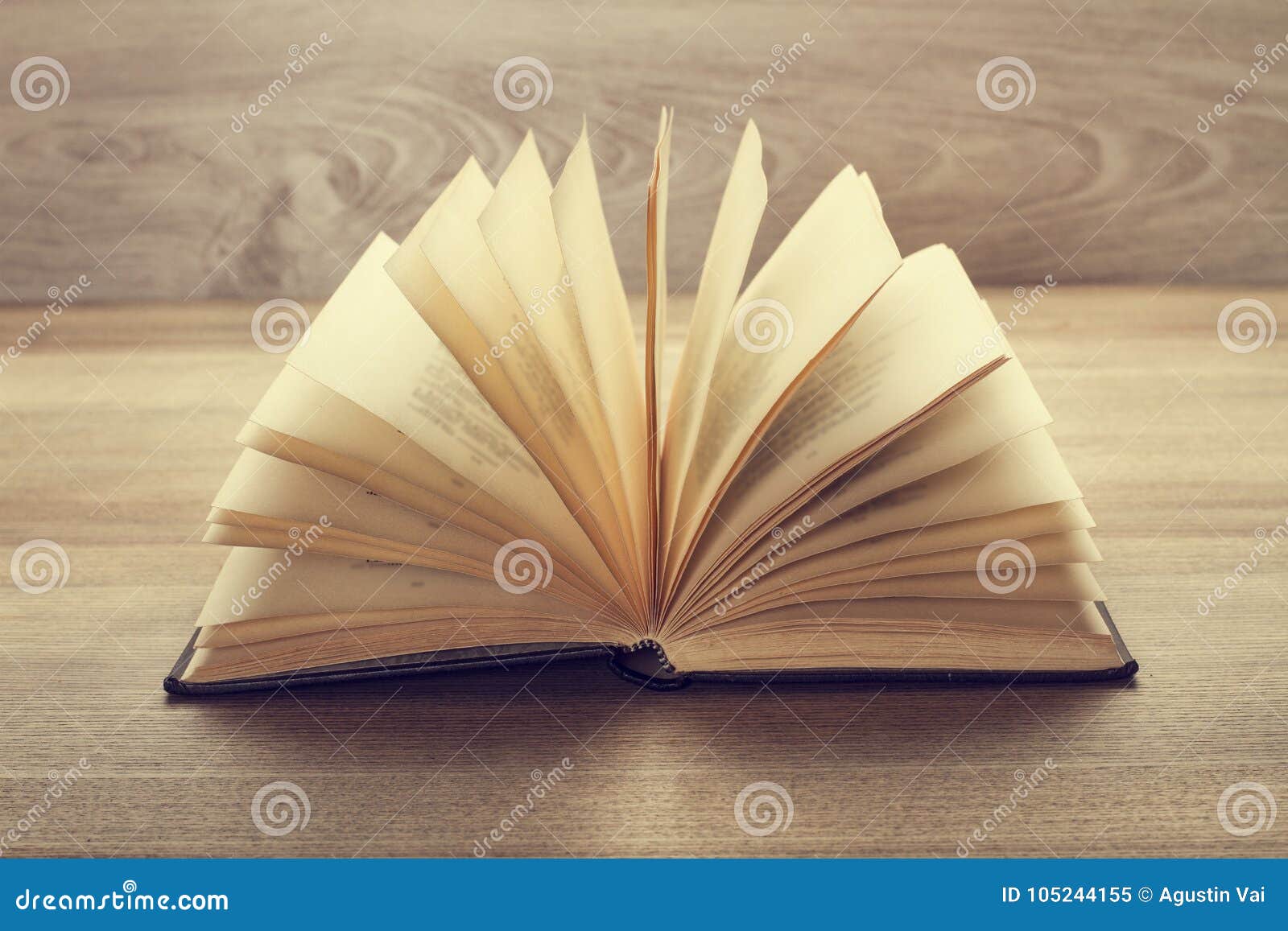 Open book on a desk stock image. Image of classic, desk - 105244155