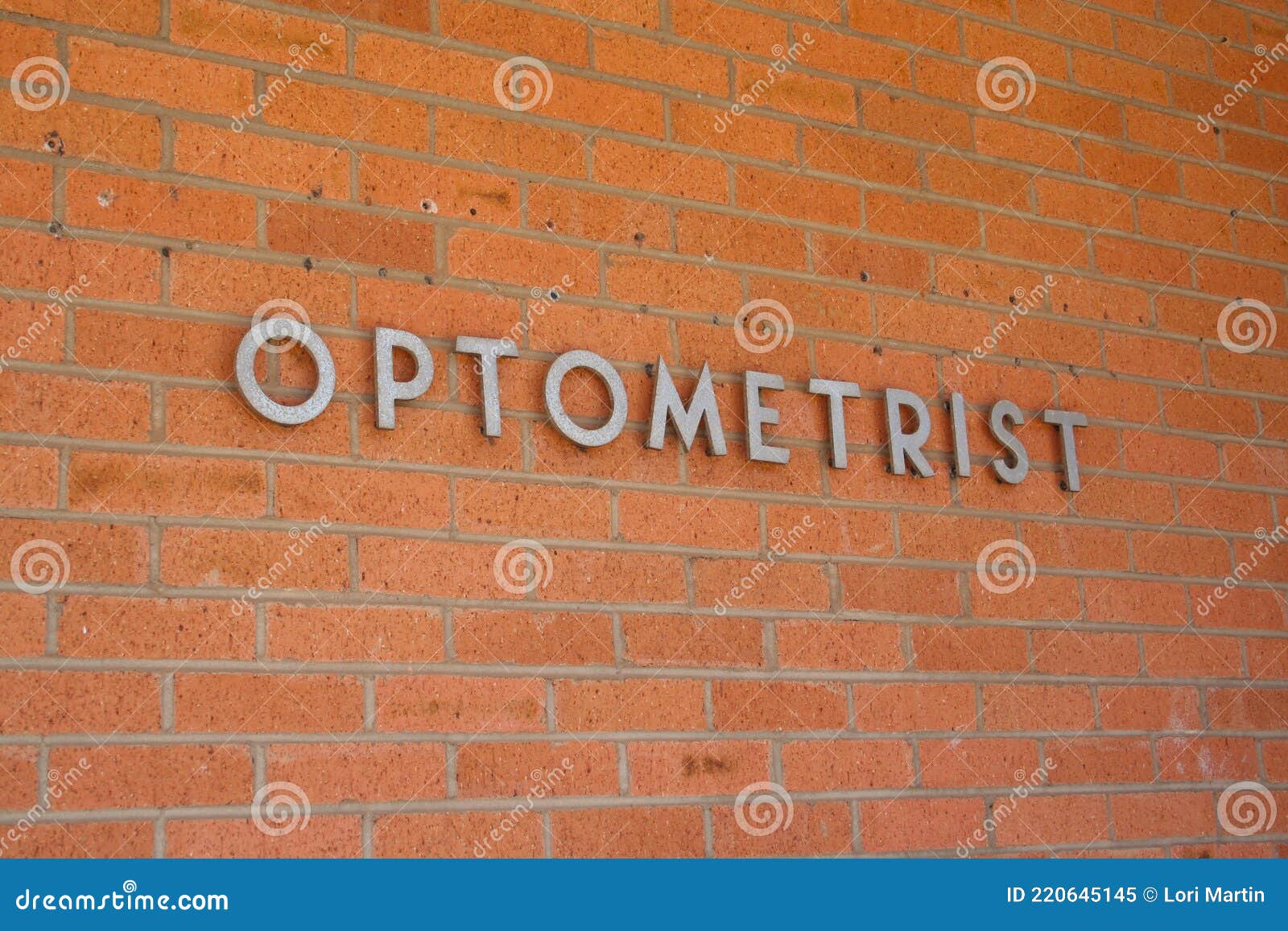 Vintage Optometrist Sign on Red Brick Wall Stock Image - Image of sign ...