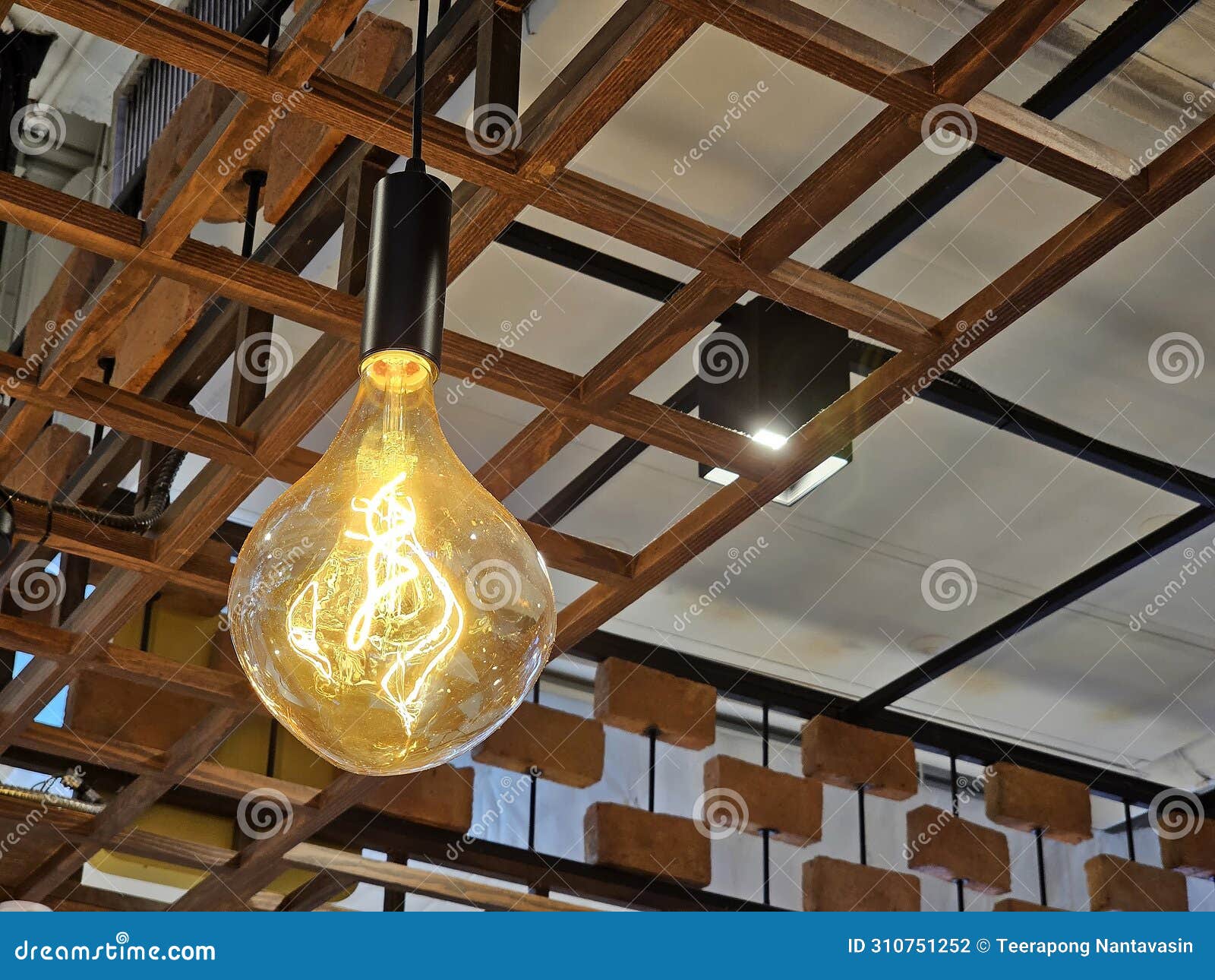 Vintage Oversized Bulb Hanging on Ceiling. Stock Photo - Image of ...