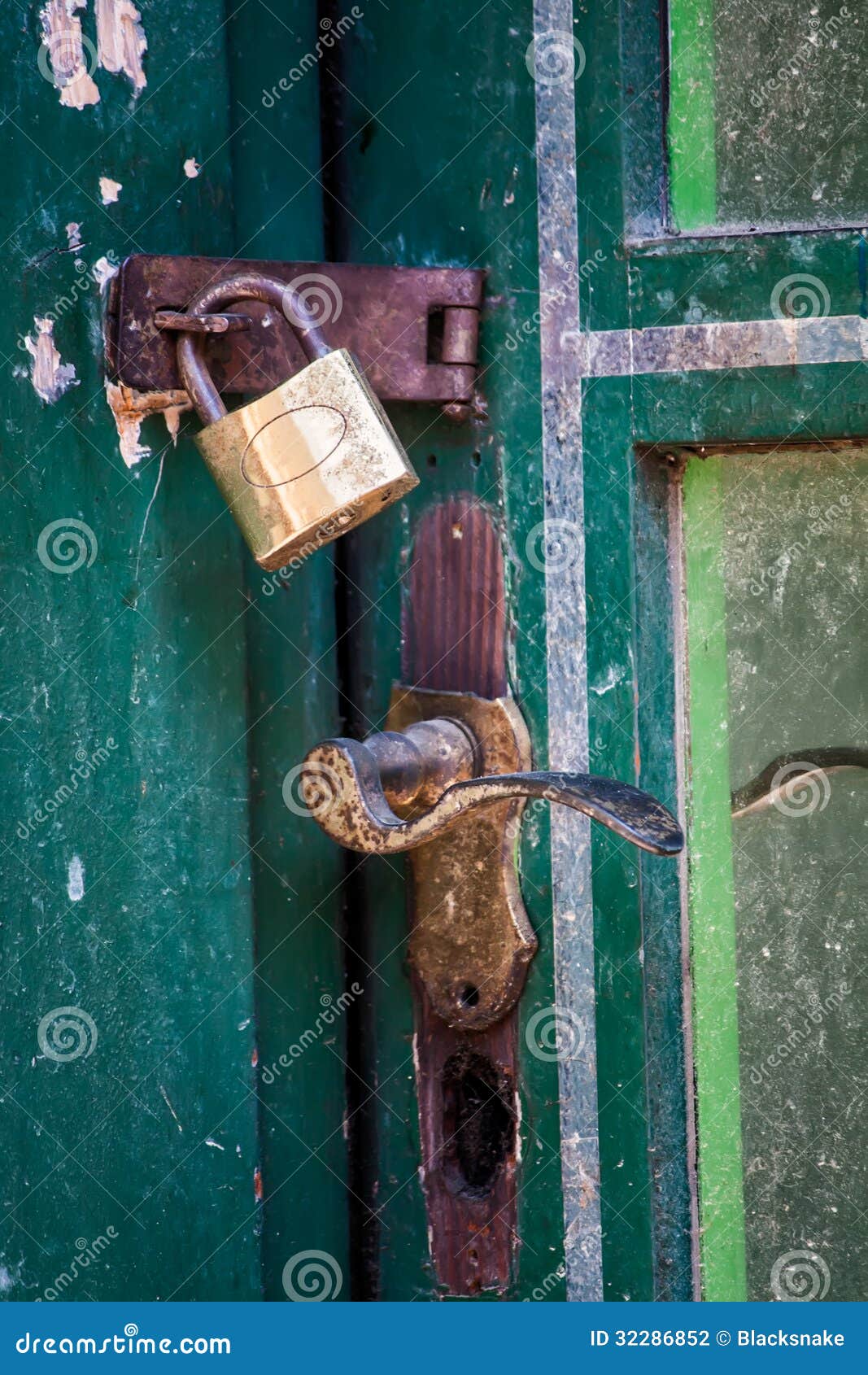 Vintage Padlock Handle at Green Door Stock Photo - Image of rust ...