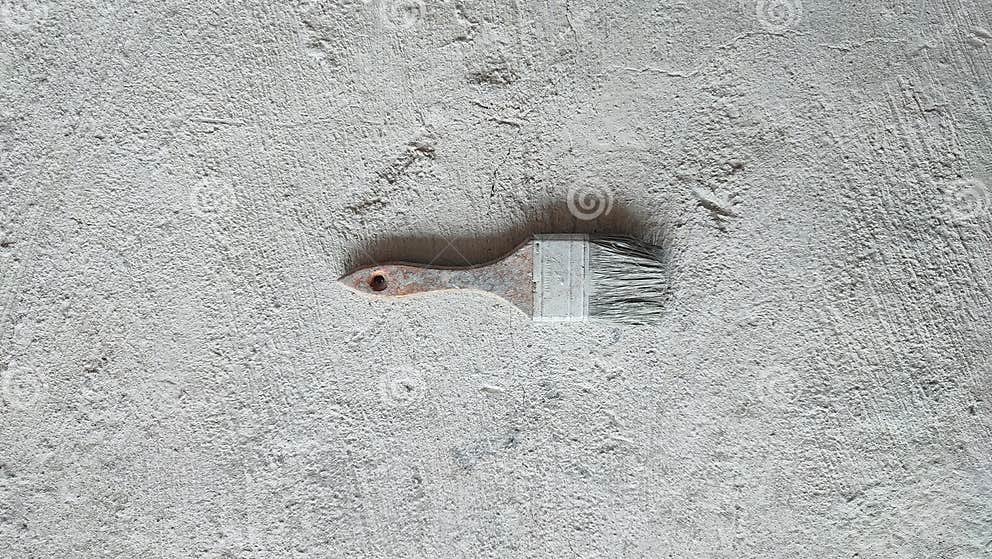 A Vintage Paint Brush Resting on a Textured Surface Stock Image - Image ...