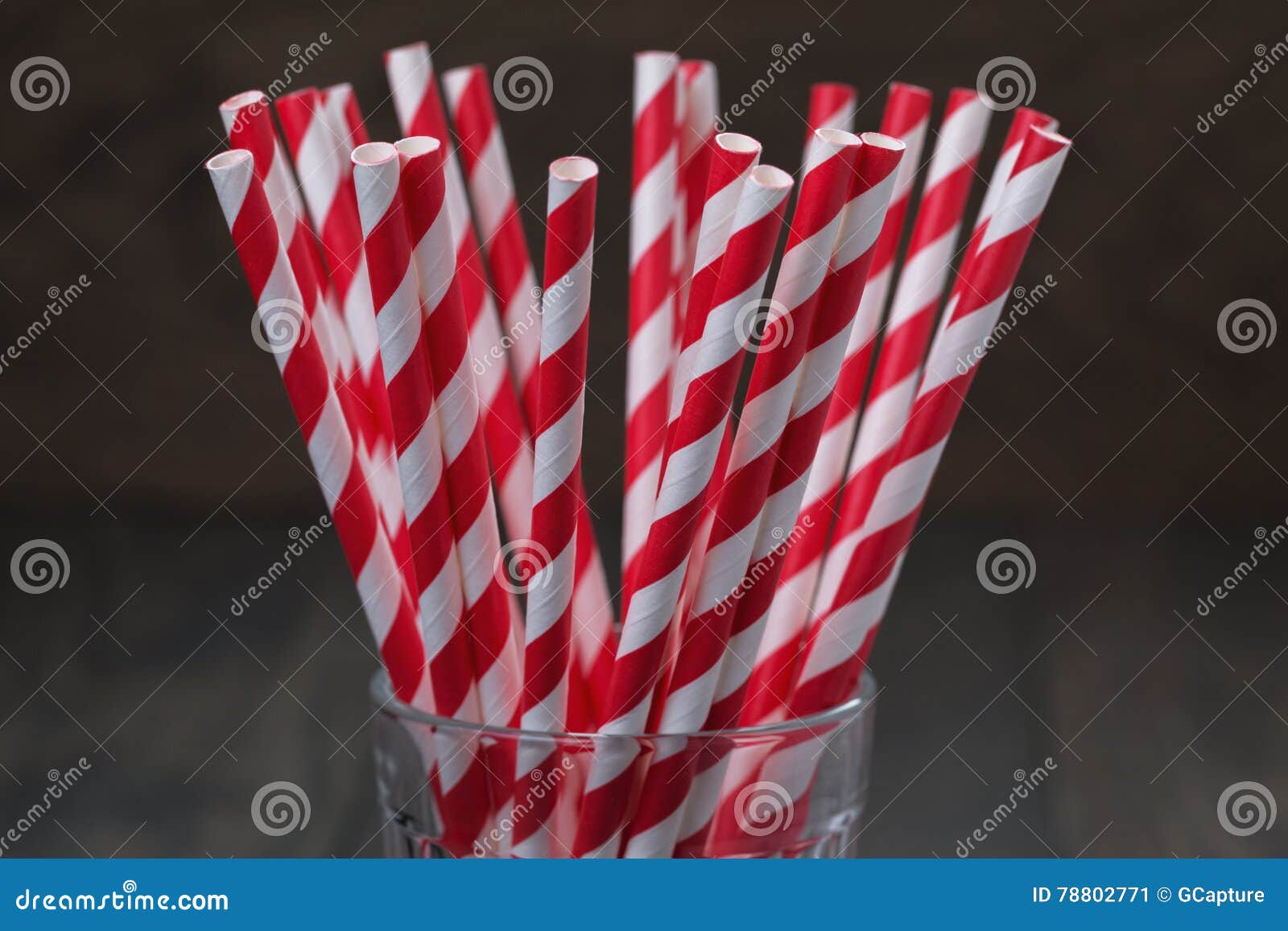 Vintage Paper Straws in Glass on Wood Table Stock Image - Image of ...