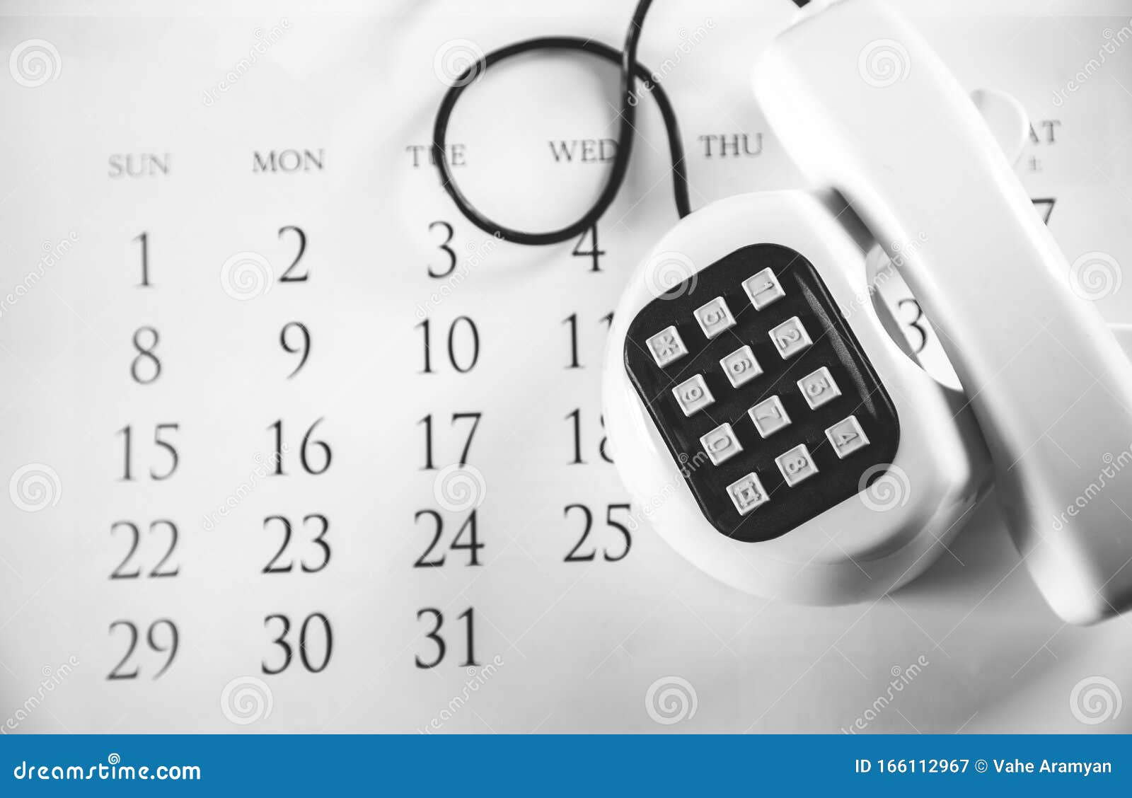 Vintage phone on calendar stock image. Image of space - 166112967