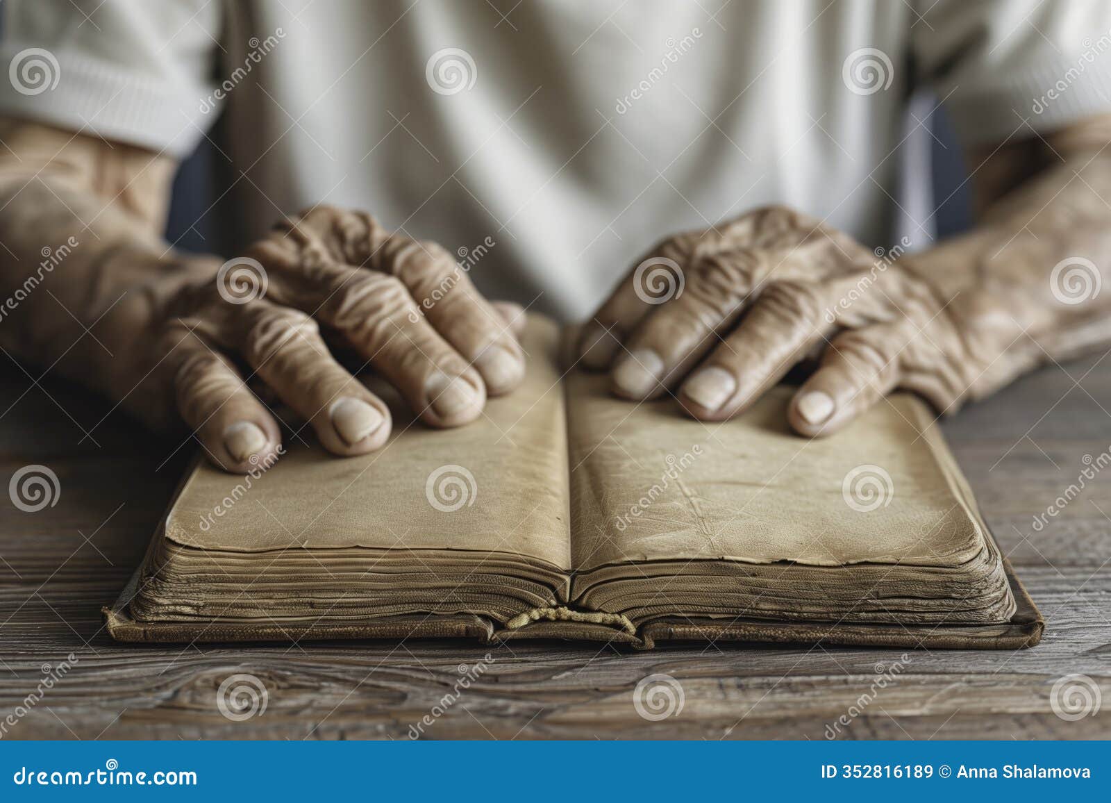 Vintage Reading and Knowledge: Hands of an Elderly Person with an Old ...