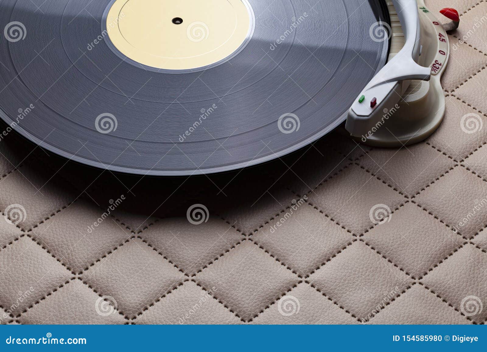 Vintage Record Player with Vinyl Record on Leather Background Stock ...