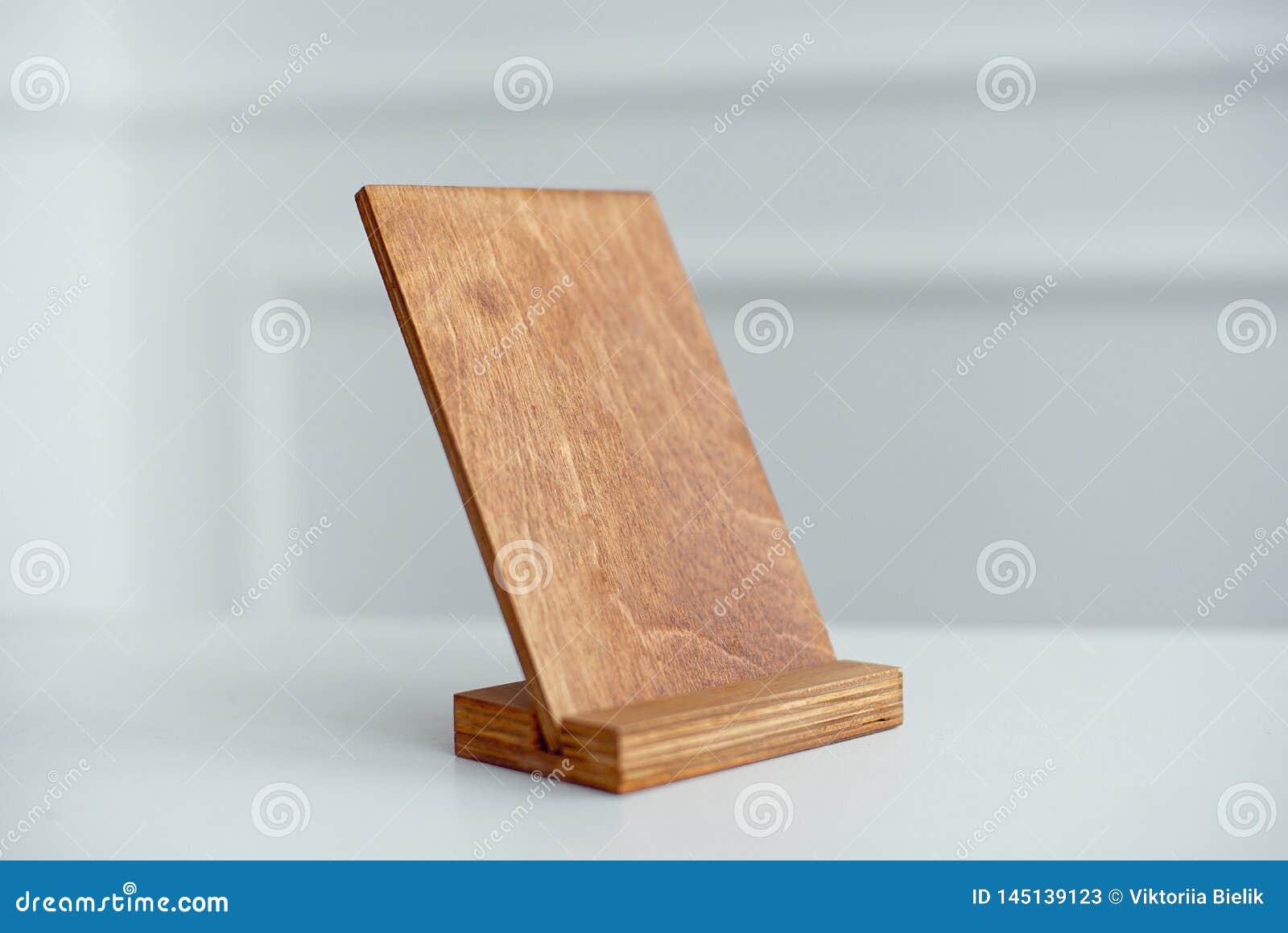 Vintage Rectangular Shaped Wooden Number Buttons on a White Wooden ...