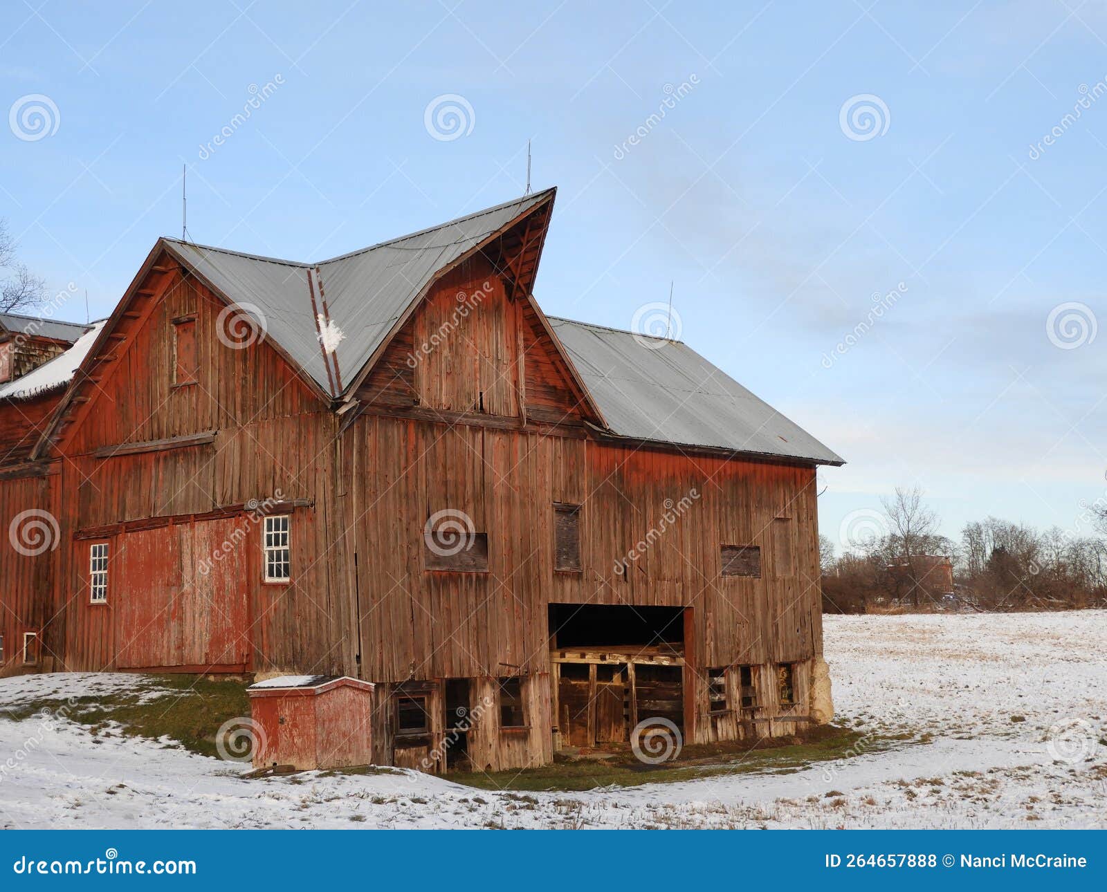 Vintage Historic Red Timberframe Barn Showing Joined Roofs Stock Photo ...