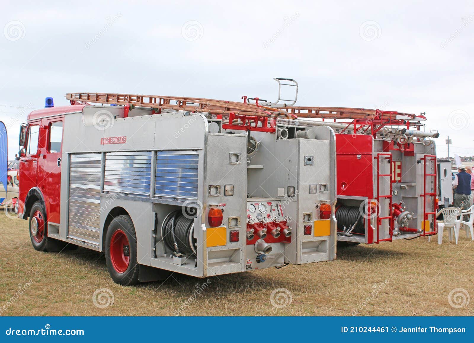 Vintage red Fire Engines stock image. Image of safety - 210244461