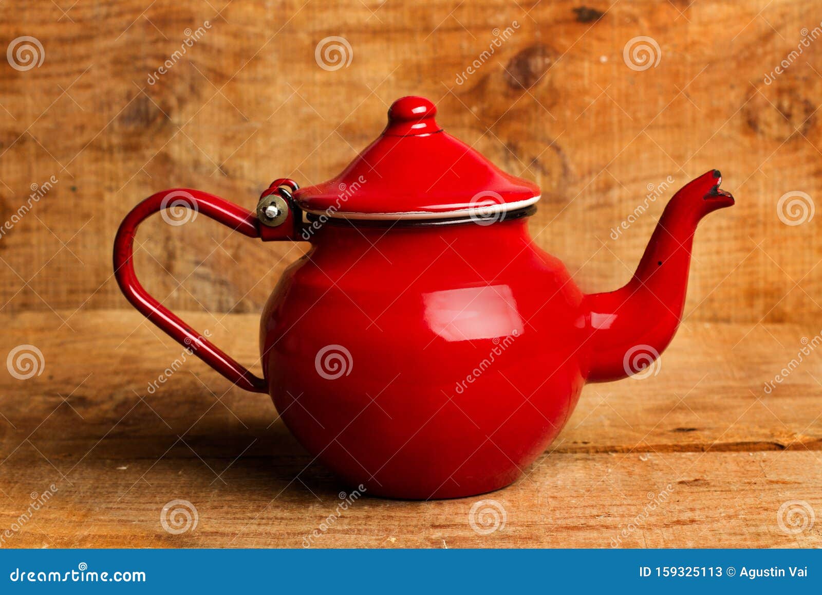 Red Teapot on a Wooden Table Stock Image - Image of color, object ...