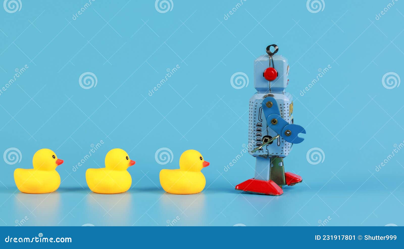 Vintage Retro Robot and Yellow Rubber Bath Ducks, Leadership Stock ...