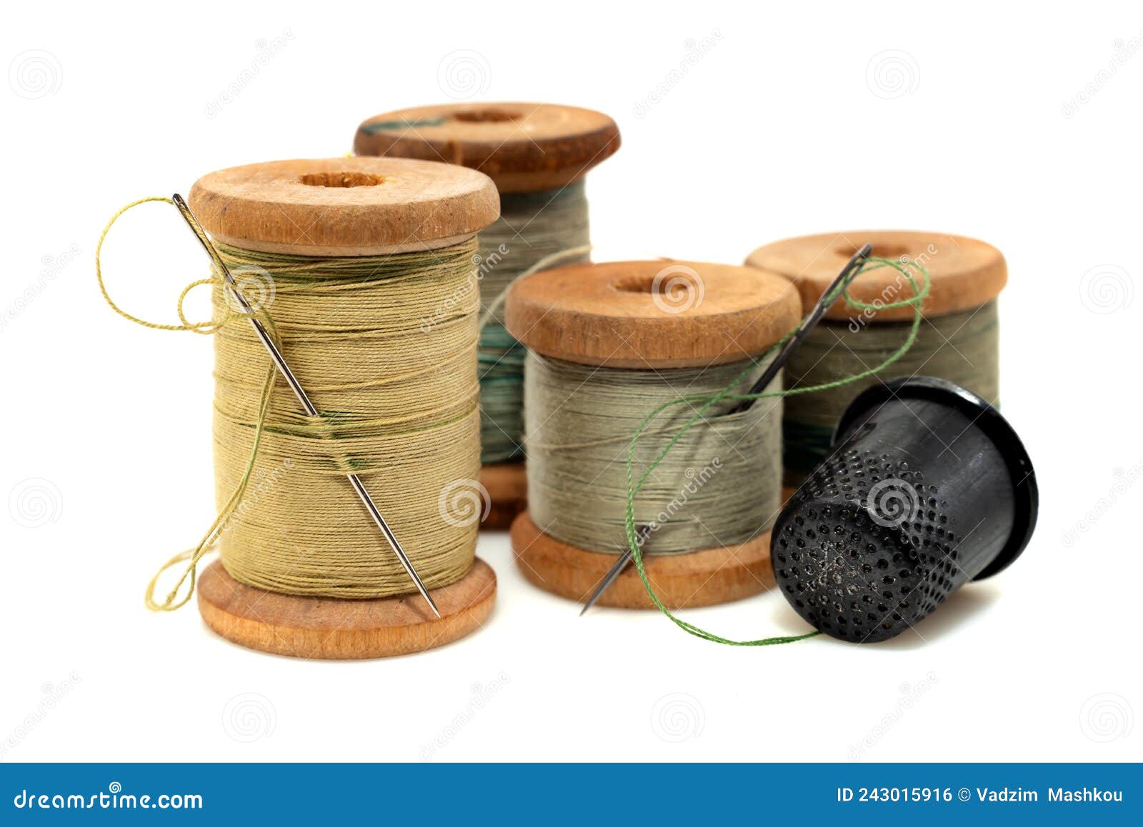 Vintage Retro Spool of Thread on a White Background. Needle with Thread ...