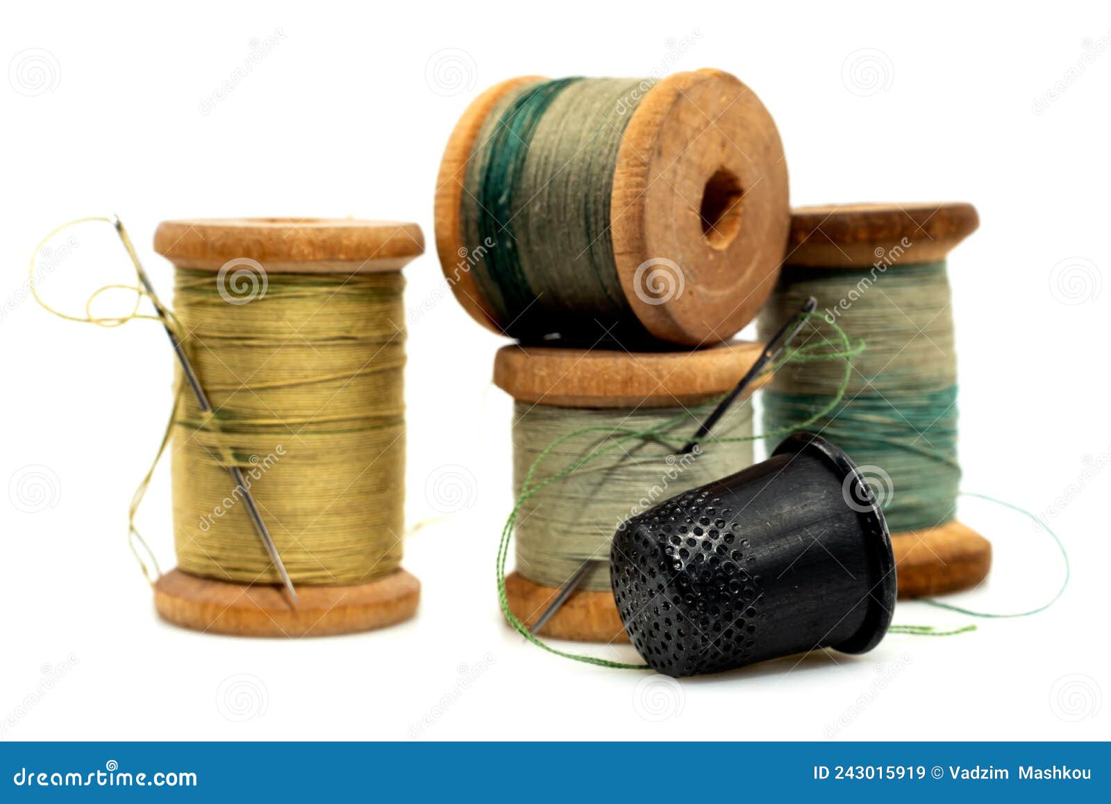 Vintage Retro Spool of Thread on a White Background. Needle with Thread ...