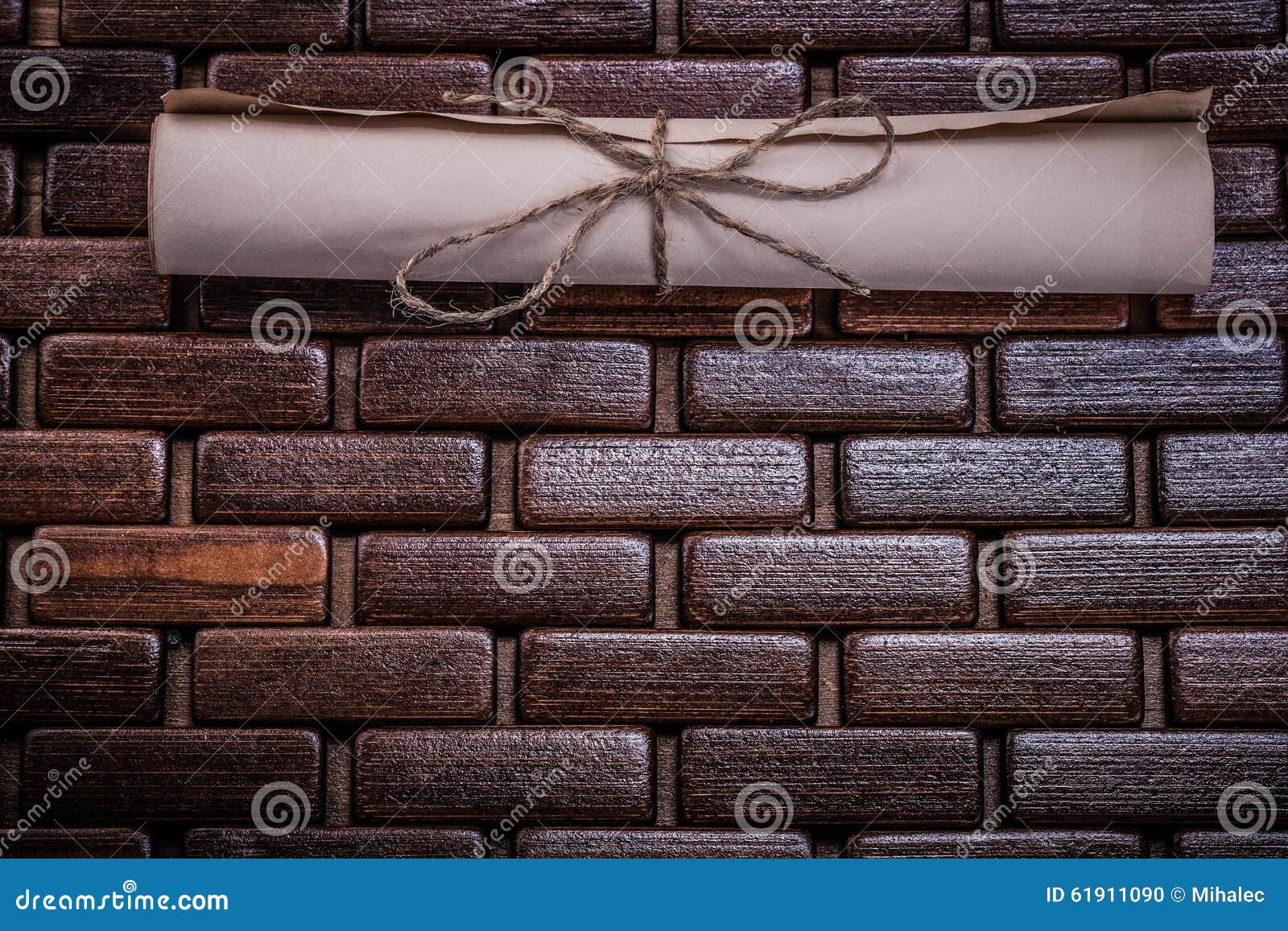 Vintage Roll of Paper on Wooden Mat Stock Photo - Image of string ...
