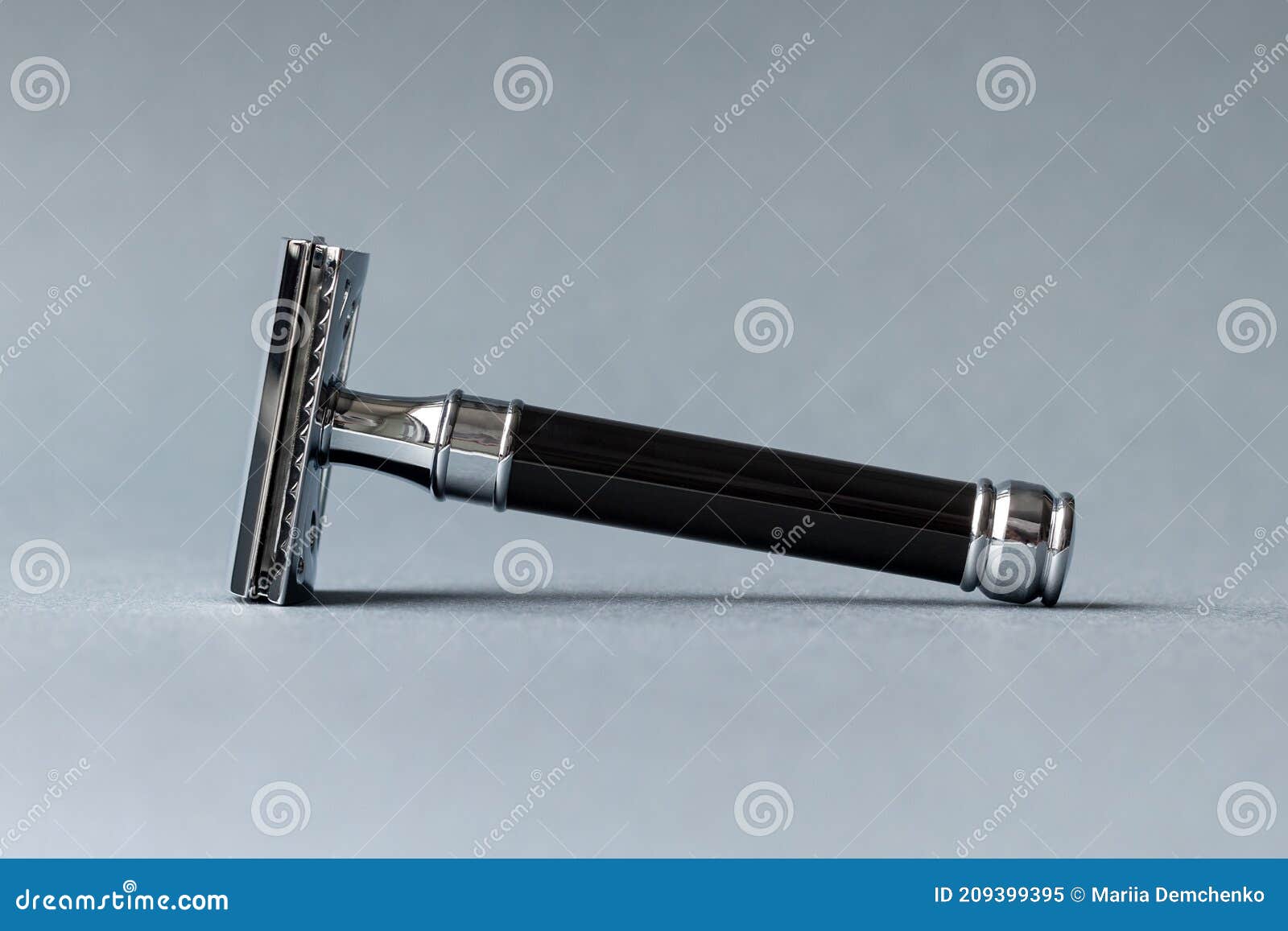 Vintage Safety Metal and Plastic Razor on a Gray Background. Selective ...