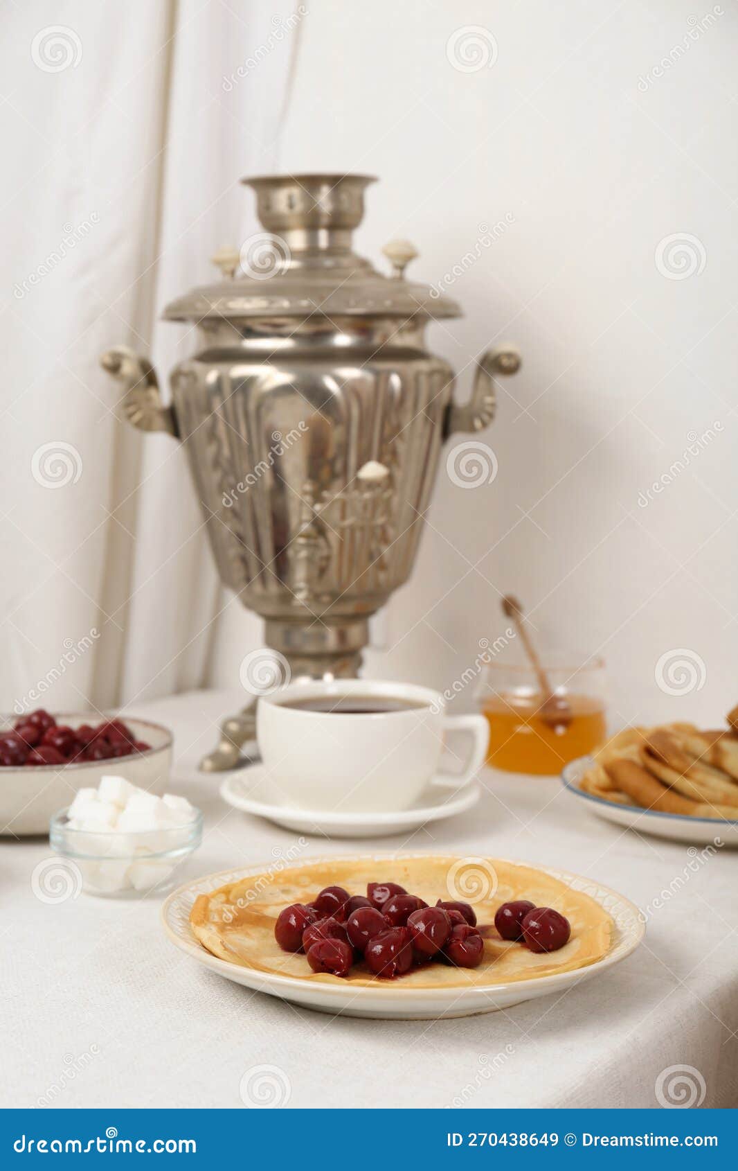 Vintage Samovar Cup Of Hot Drink And Snacks Served On Table