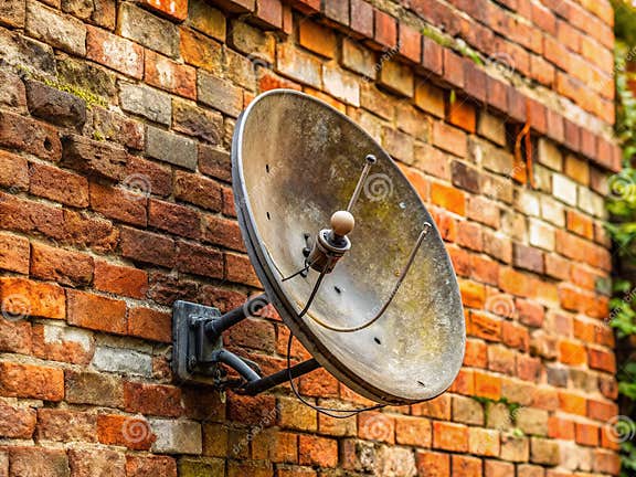 Vintage Satellite Dish and Decoder on Brick Wall a Timeless Urban ...