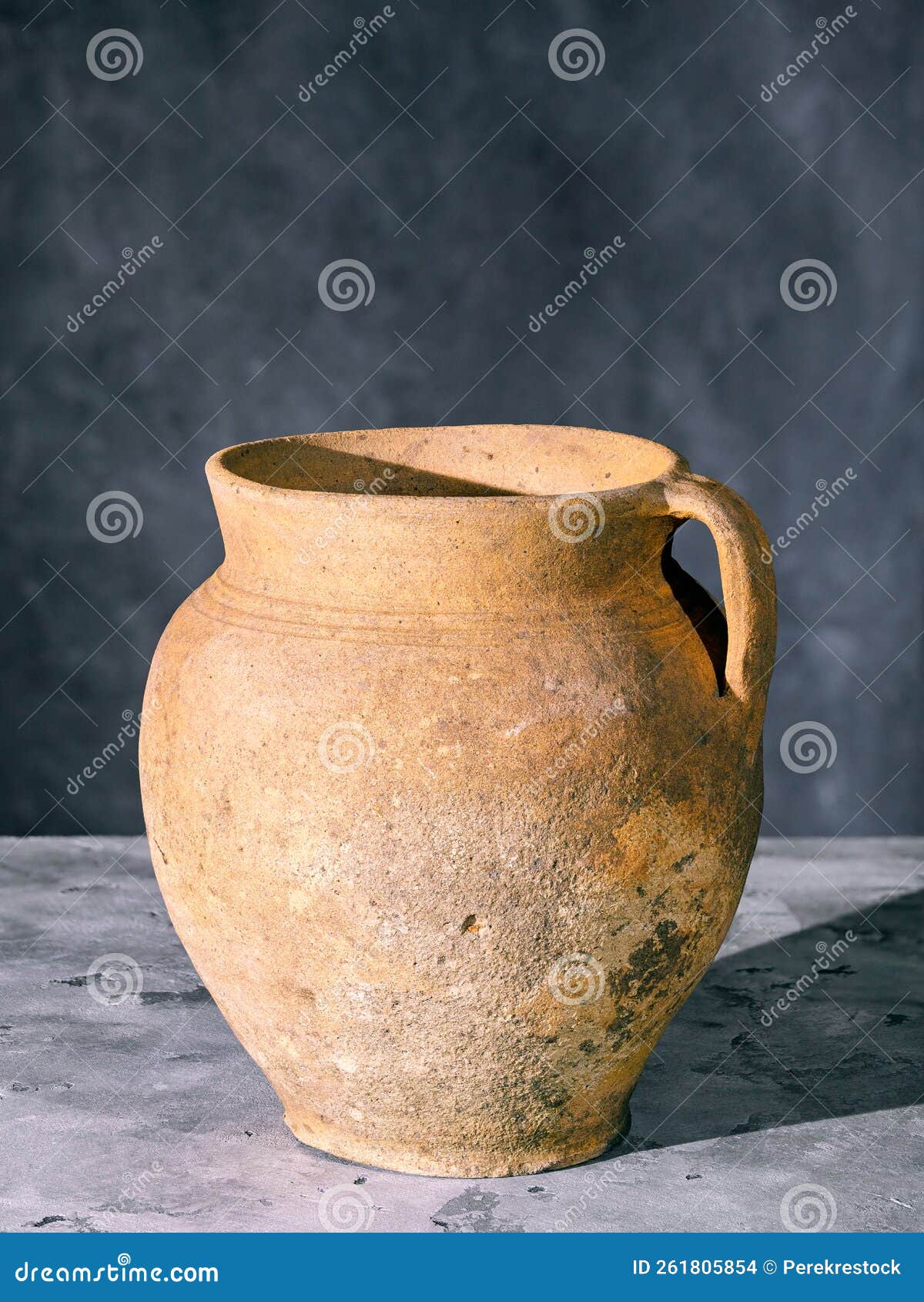 Vintage Shabby Clay Jug with Handle on a Concrete Surface Stock Photo ...