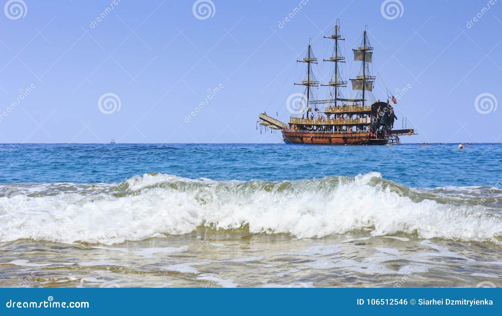 Vintage Ship Floating on Waves in Blue Sea Water. Stock Photo - Image ...