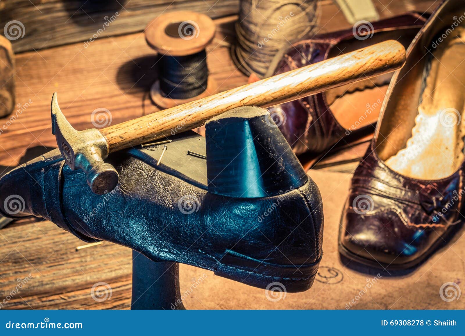 Vintage Shoemaker Workplace with Tools, Shoes and Leather Stock Photo ...