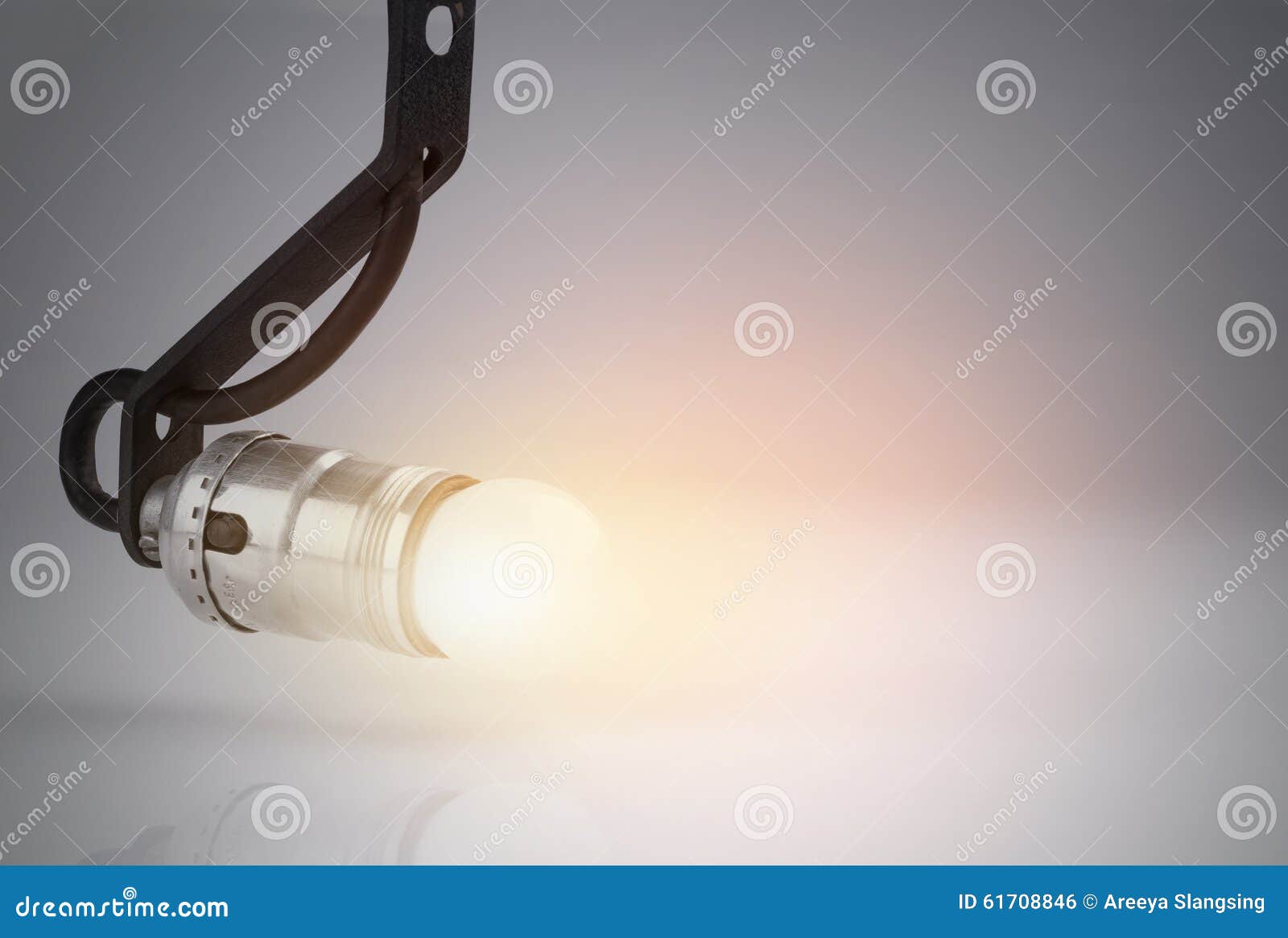 Vintage Small Light Bulb on the Iron Holder Stock Photo - Image of ...