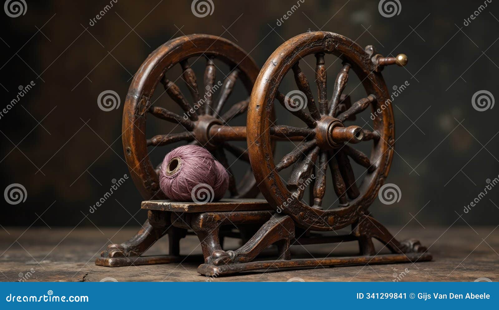 Vintage Spinning Wheel with Intricate Carvings and Wool Thread on ...