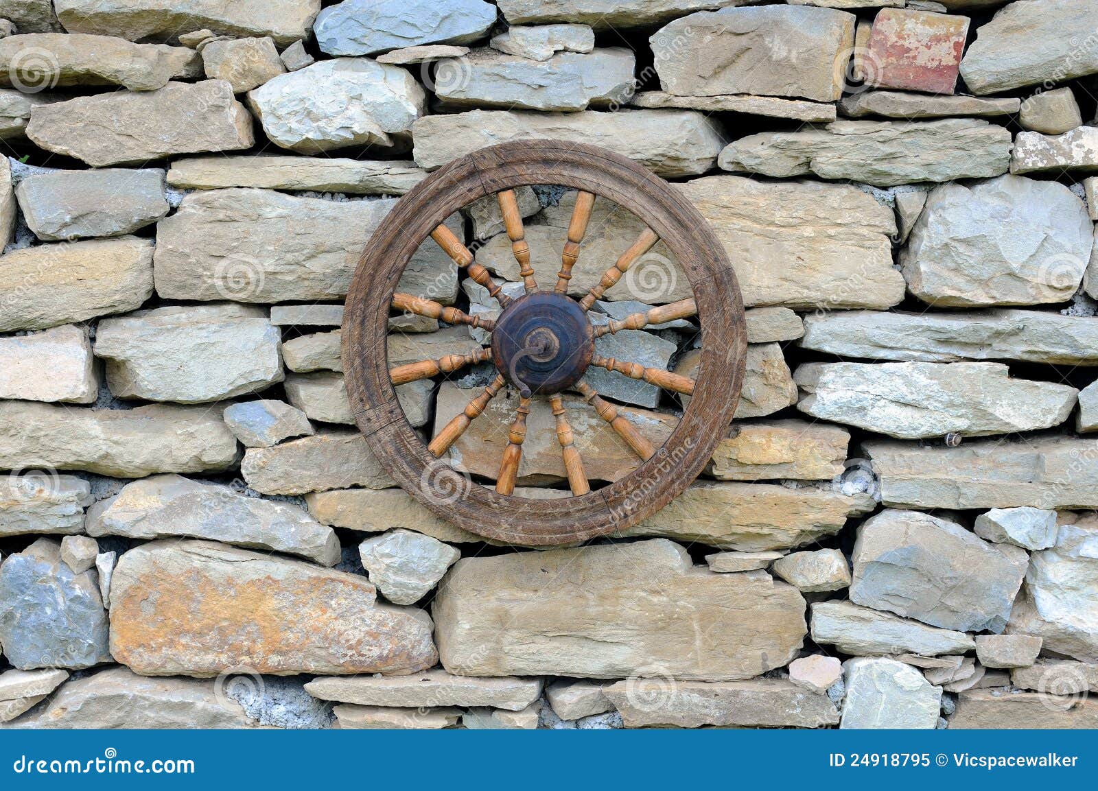 Vintage Spinning Wheel on Stone Wall Stock Image - Image of rock ...