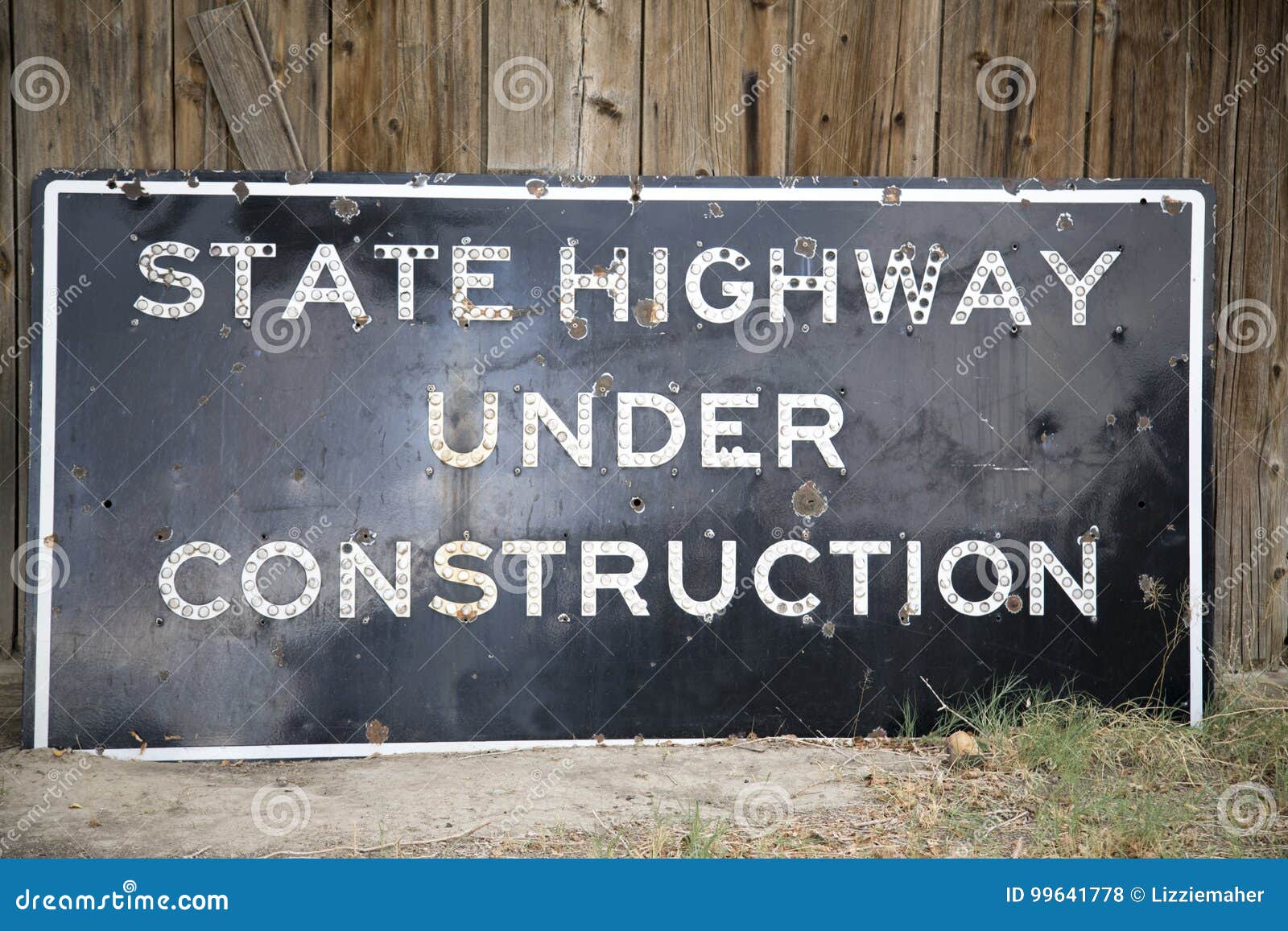 State Highway Under Construction Sign Stock Photo - Image of working ...