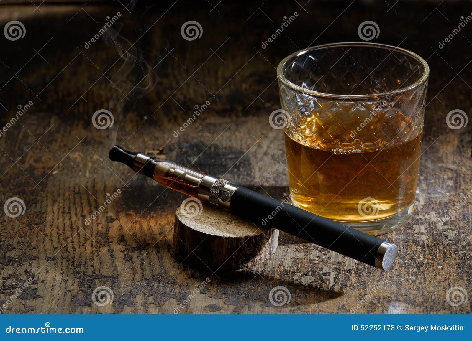 Vintage Still Life with E-cigarette and a Glass of Bourbon Stock Photo ...