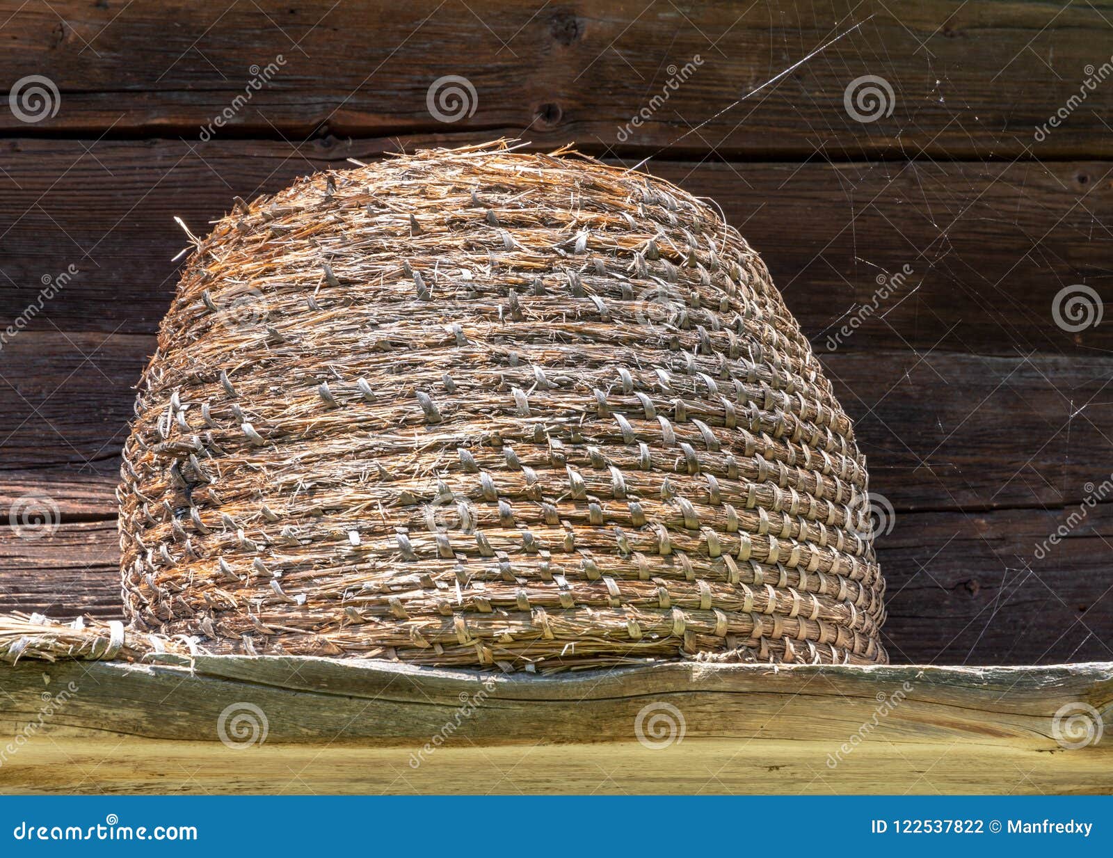 Vintage straw beehive stock photo. Image of agricultural - 122537822