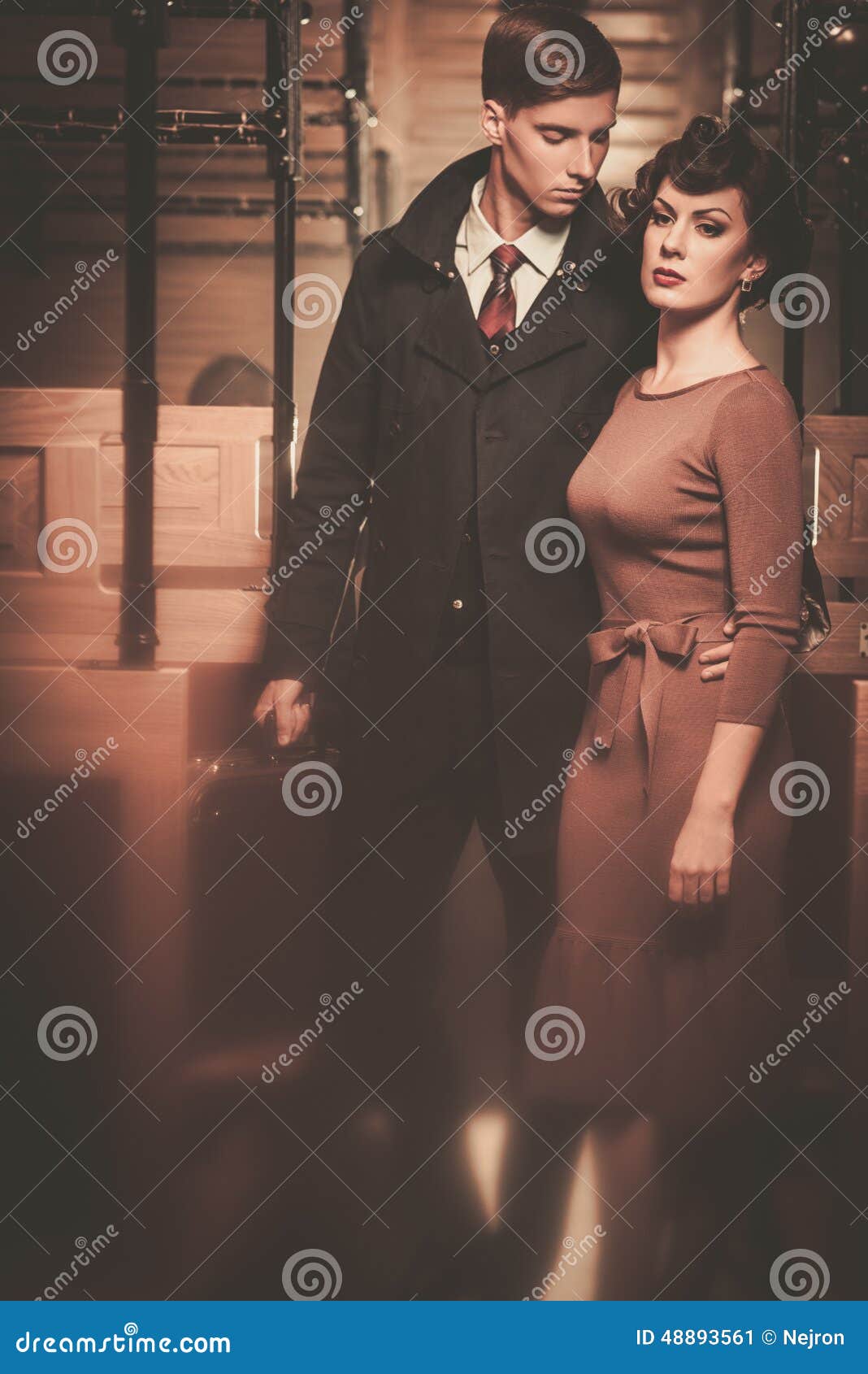 Vintage style couple stock image. Image of leaving, coat - 48893561