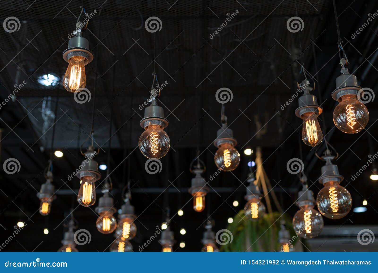 Vintage Style Light Bulb in a Cafe Shop Stock Photo - Image of abstract ...