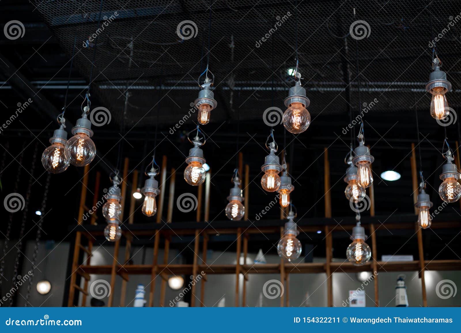 Vintage Style Light Bulb in a Cafe Shop Stock Image - Image of power ...
