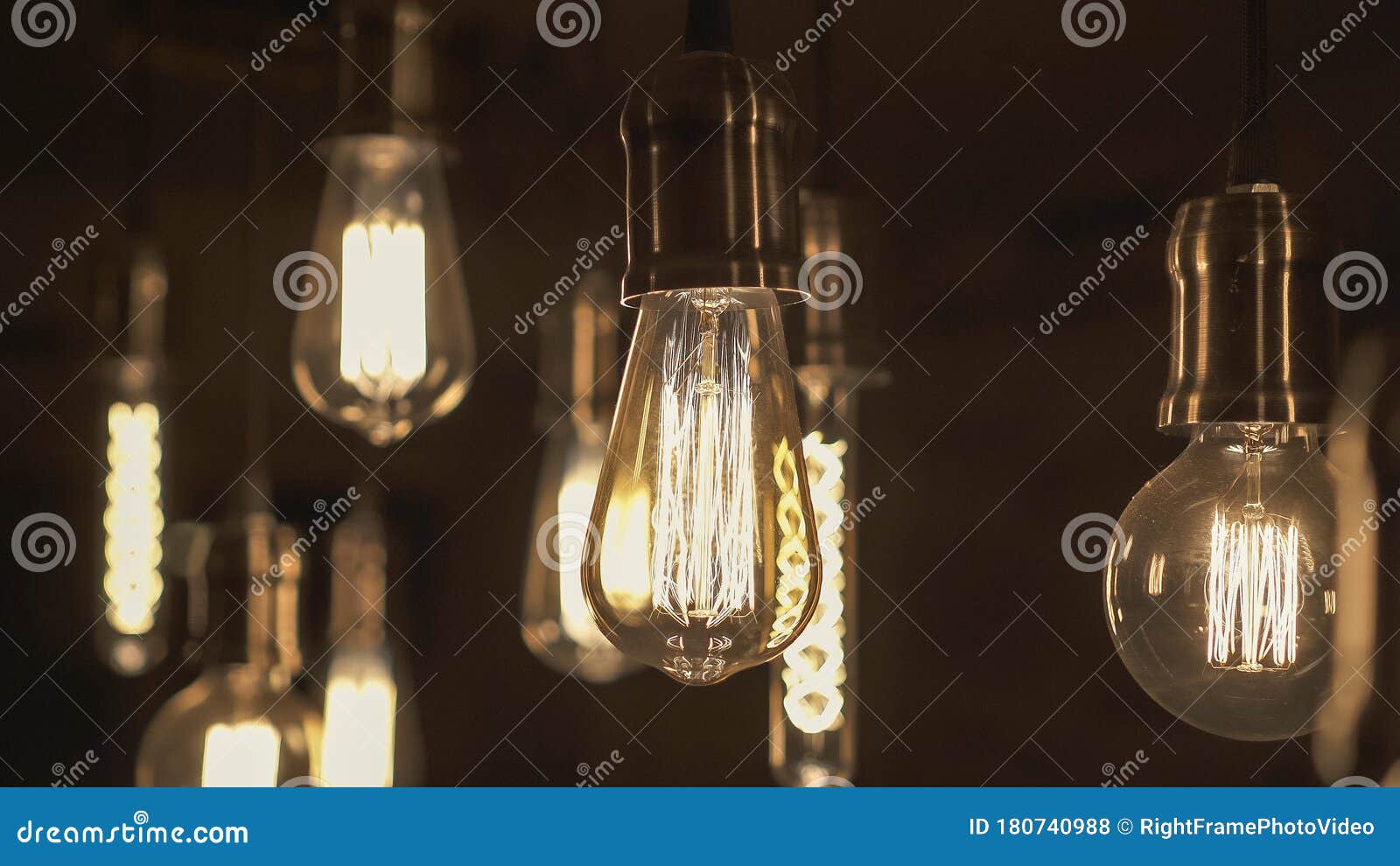 Vintage Style Light Bulbs Hanging from the Ceiling. Old Edison Bulb ...