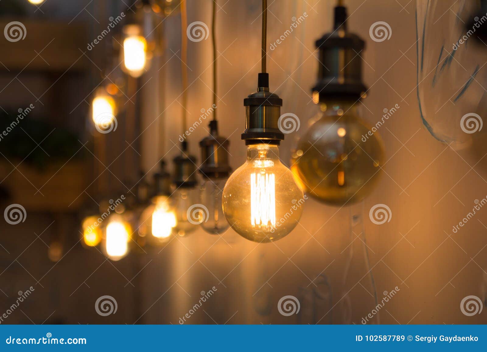 Vintage Style Light Bulbs in Interior of Restaurant Stock Image - Image ...