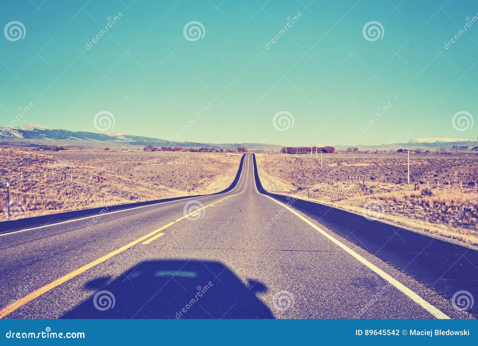 Vintage Stylized Shadow of a Car on an Empty Road. Stock Photo - Image ...