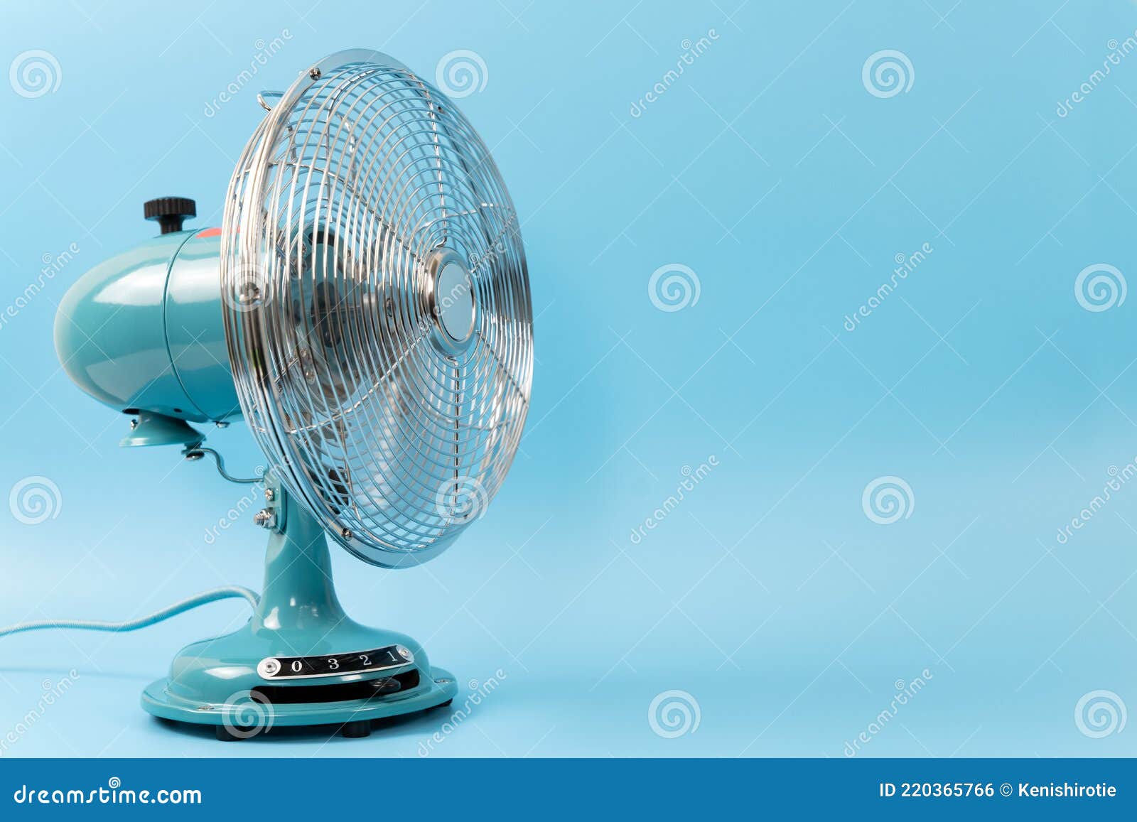 Vintage Tabletop Fan Isolated on a Blue Background Stock Photo - Image ...