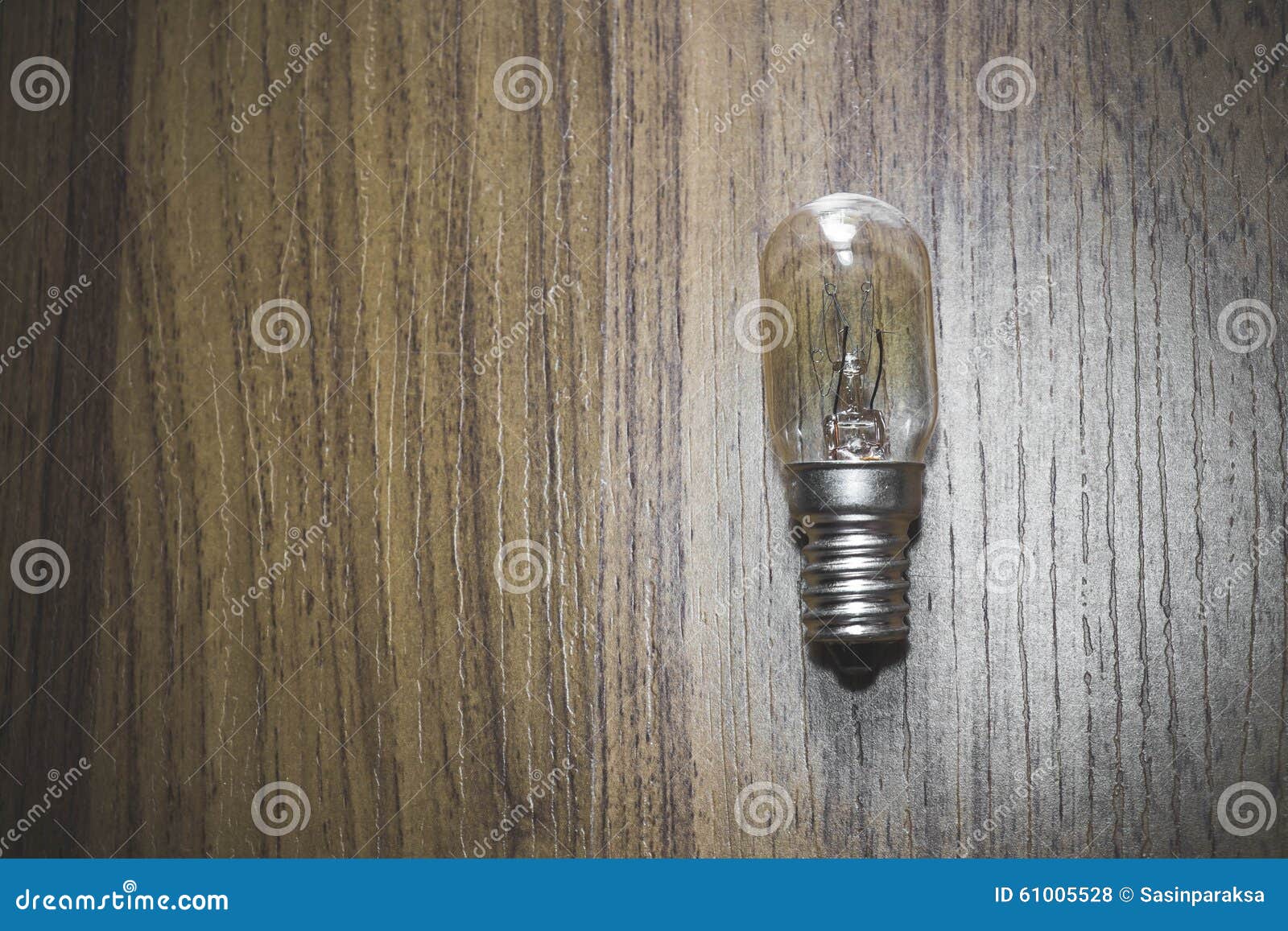 Vintage Tone, Light Bulb On Wood Background Stock Photo | CartoonDealer ...