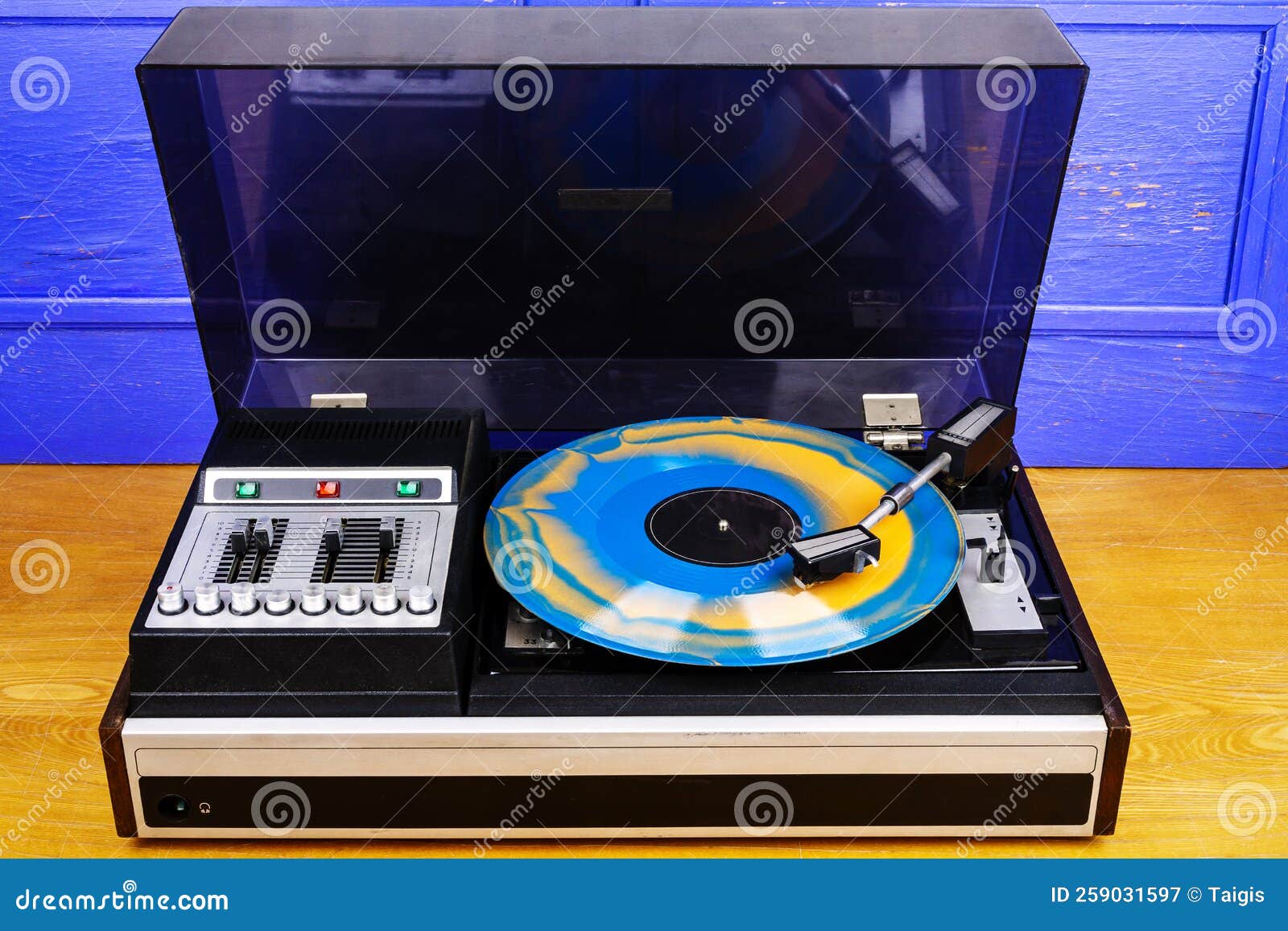 Vintage Turntable Vinyl Record Player with Blue and Orange Vinyl Stock ...