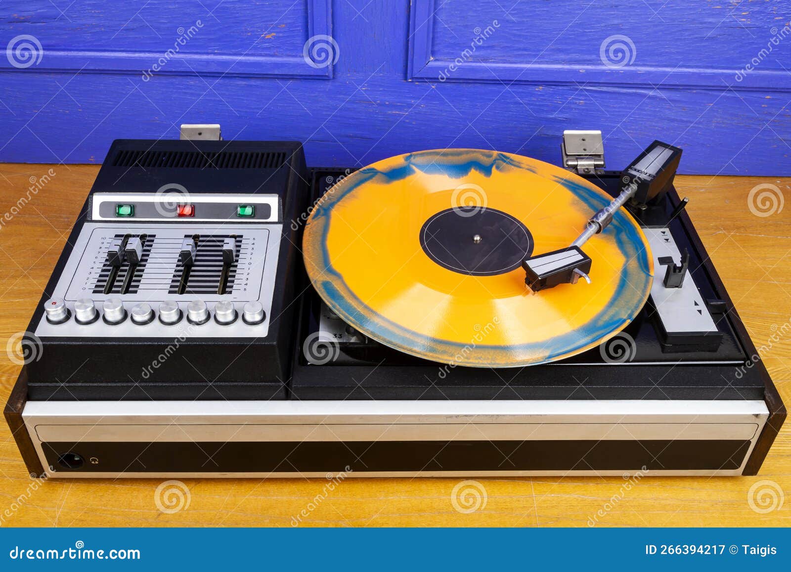 Vintage Turntable Vinyl Record Player with Blue and Orange Vinyl Stock ...